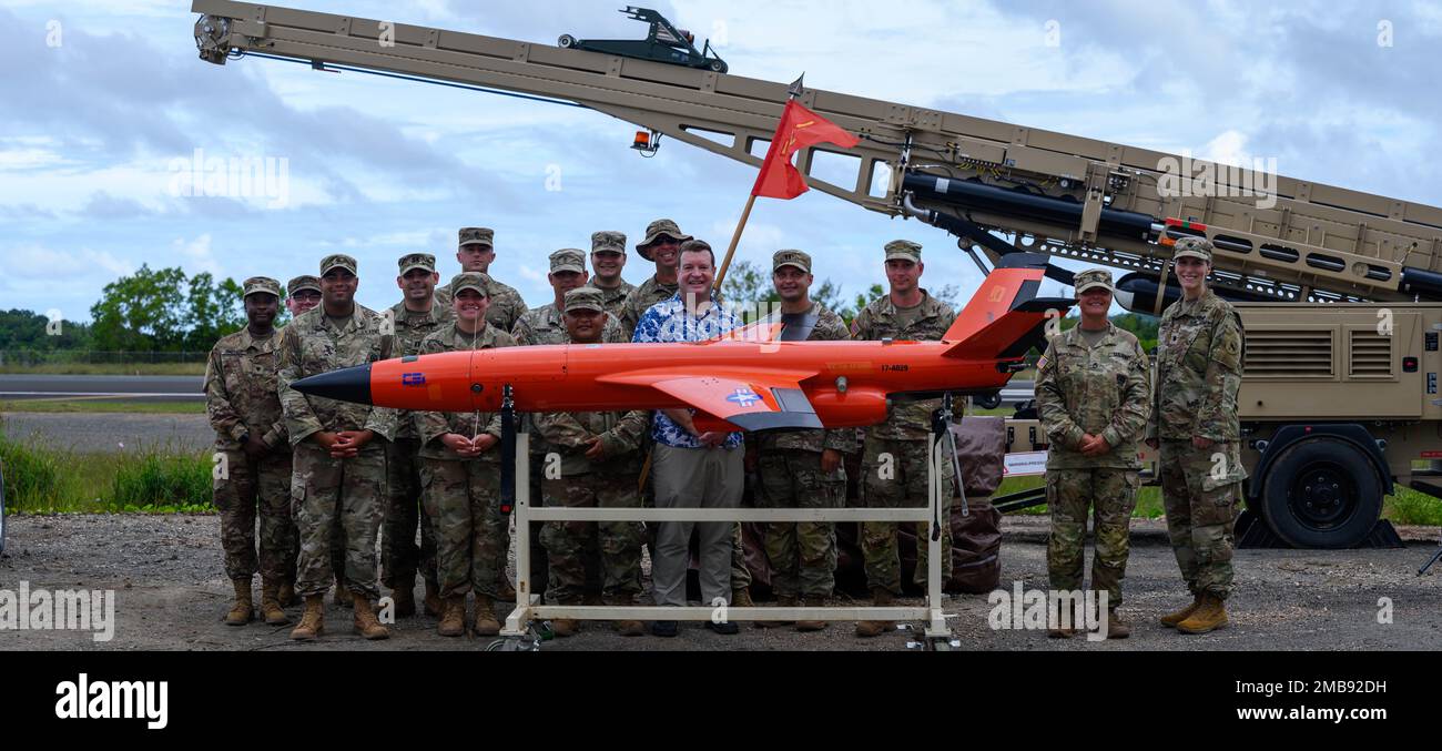 U.S. Ambassador to Palau John Hennessy-Niland pose for a group photo ...