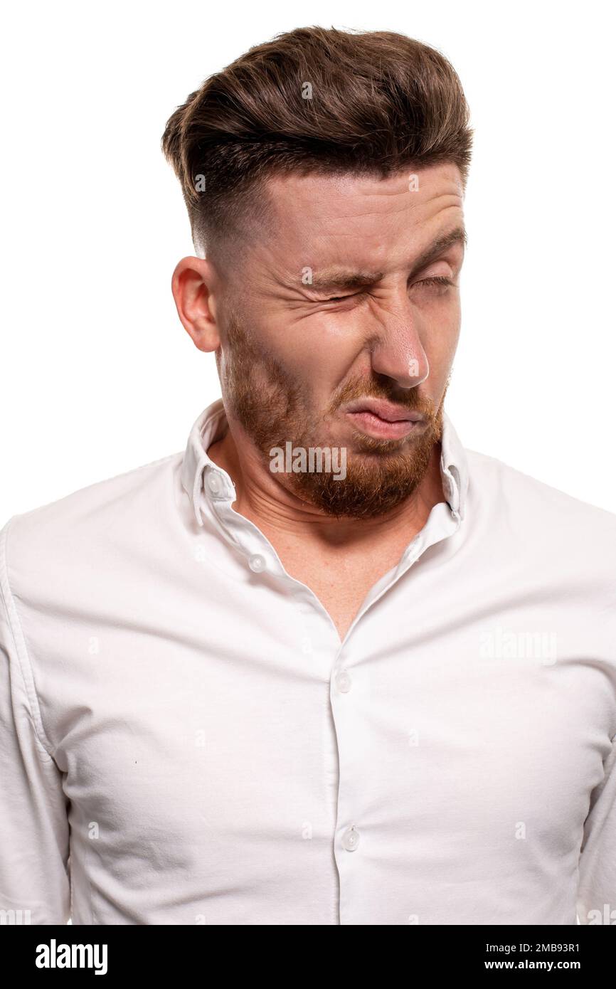 Studio photo of a good-looking man in a white shirt, isolated over a ...