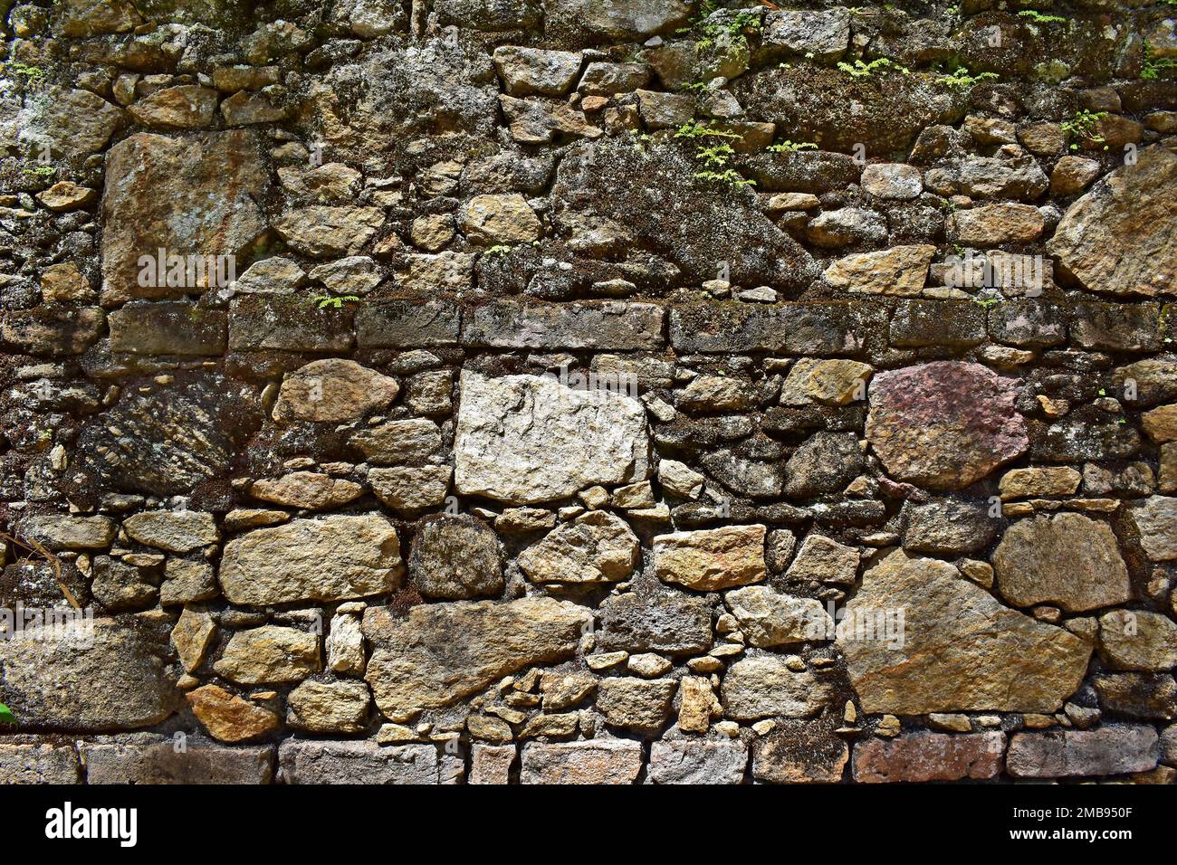Ancient stone wall in Rio de Janeiro, Brazil Stock Photo - Alamy