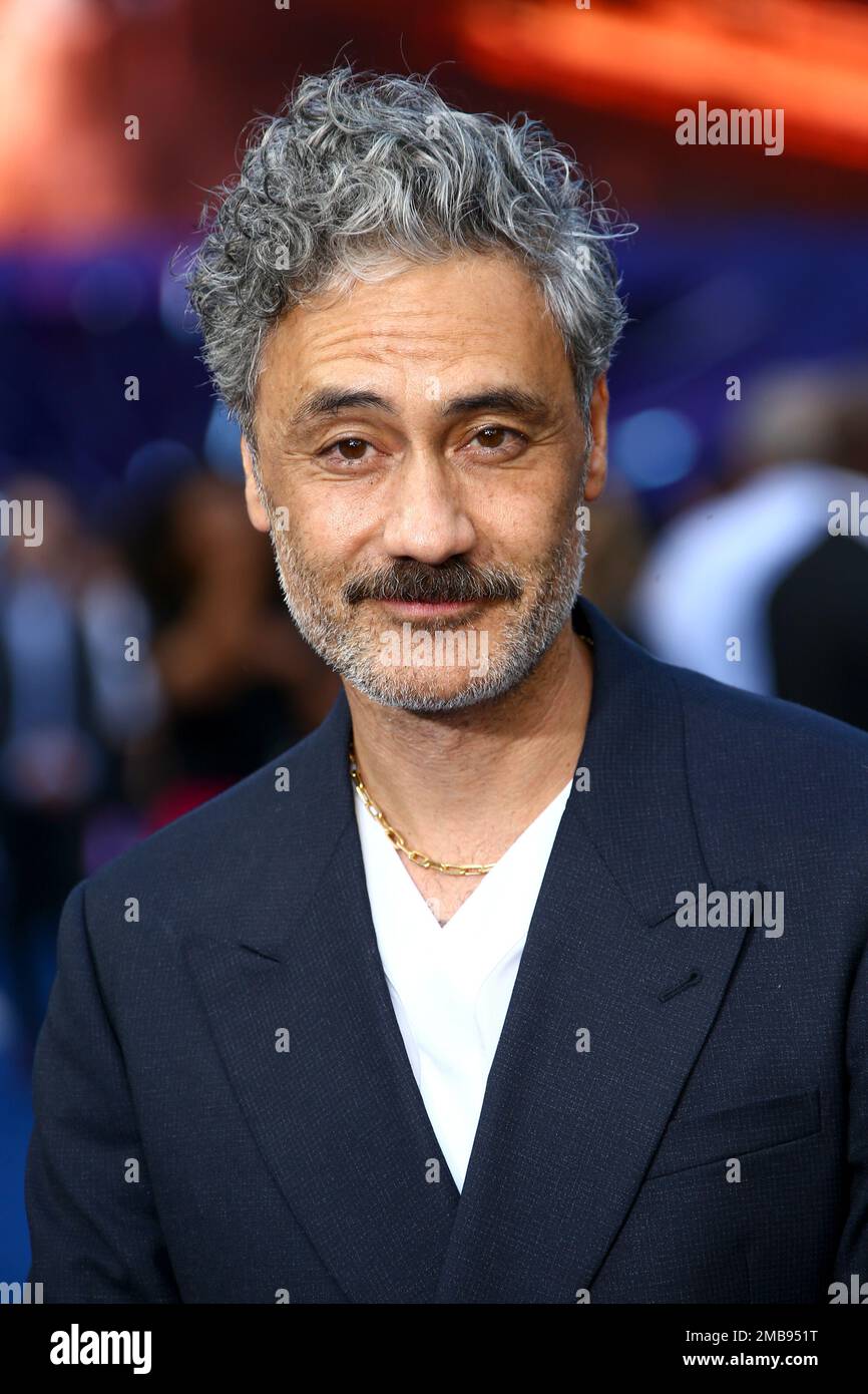 Taika Waititi poses for photographers upon arrival for the premiere of ...