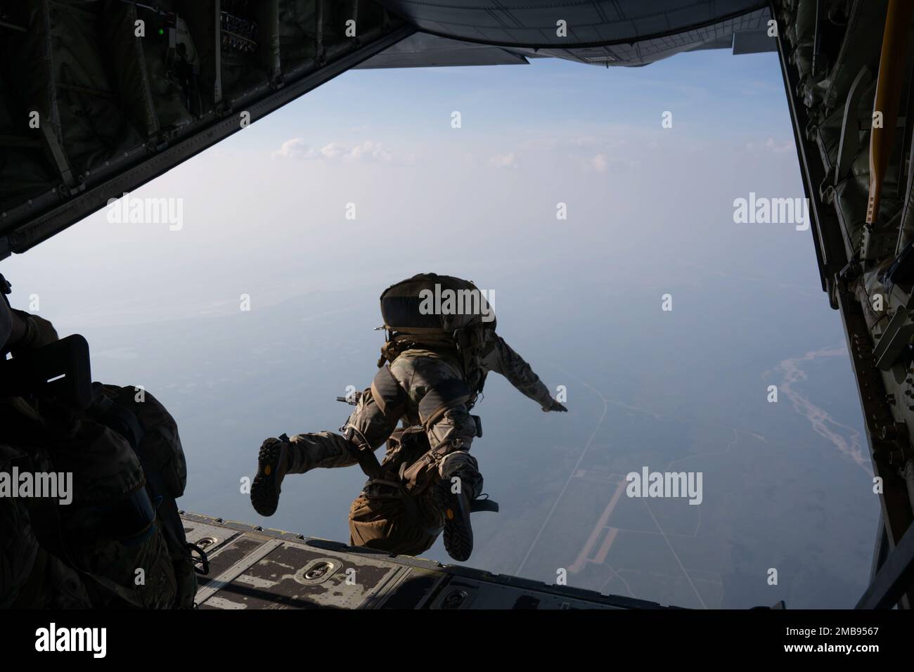 A U.S. Army 1st Special Forces Group team member conducts a military free fall jump over ...