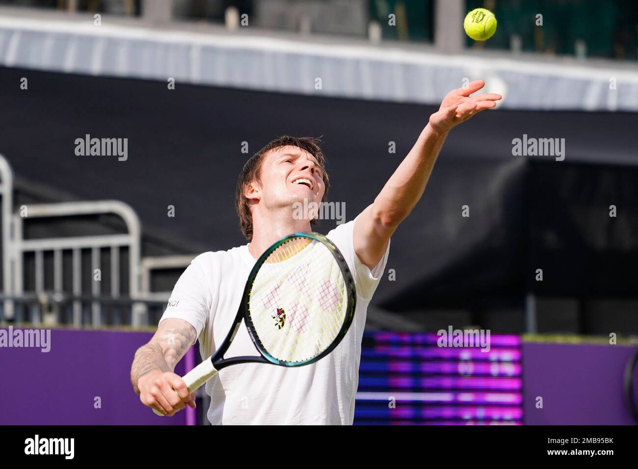 Alexander Bublik of Kazakhstan serves to Lorenzo Musetti of Italy ...