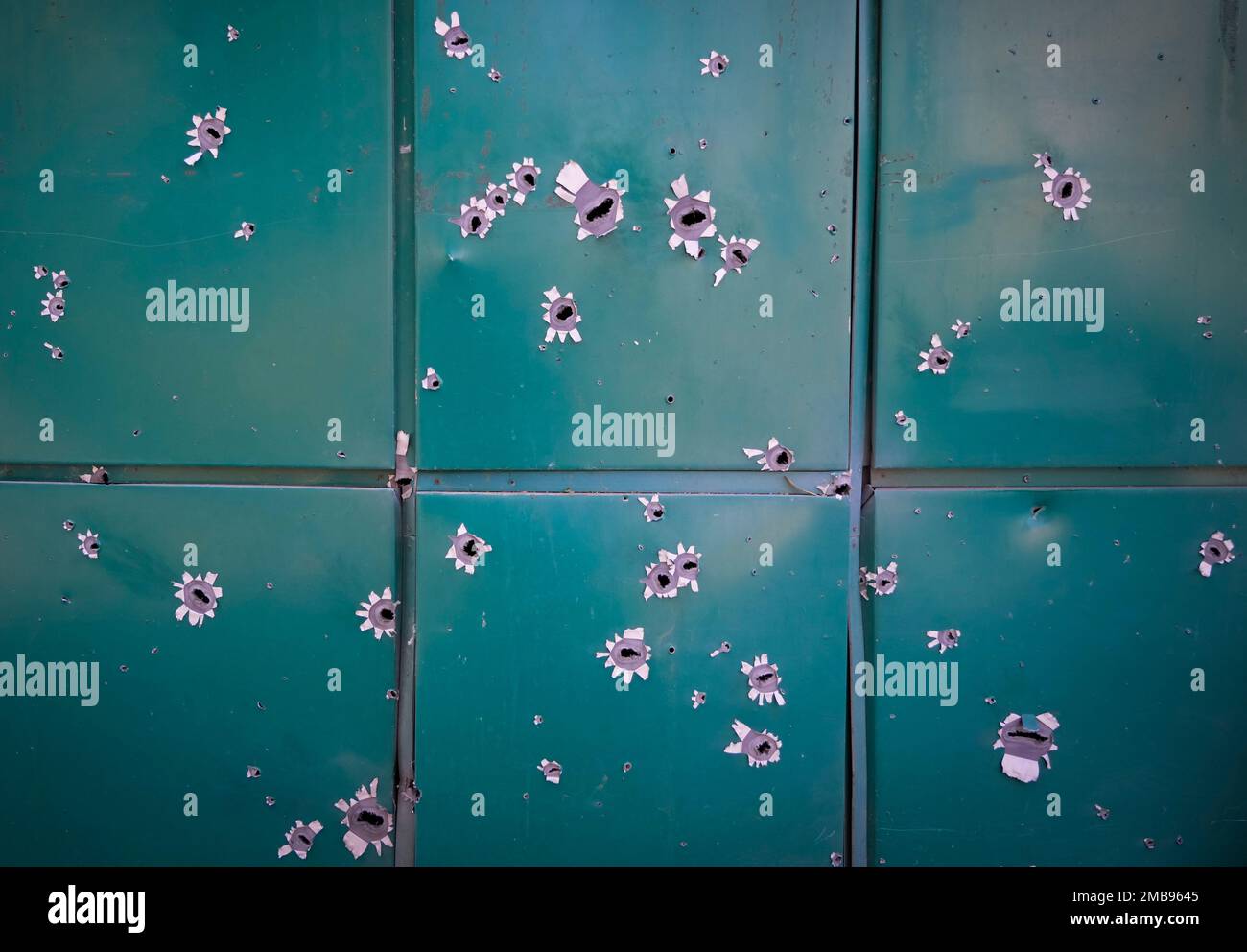 Shrapnel traces on a house damaged by Russian night shelling in the ...