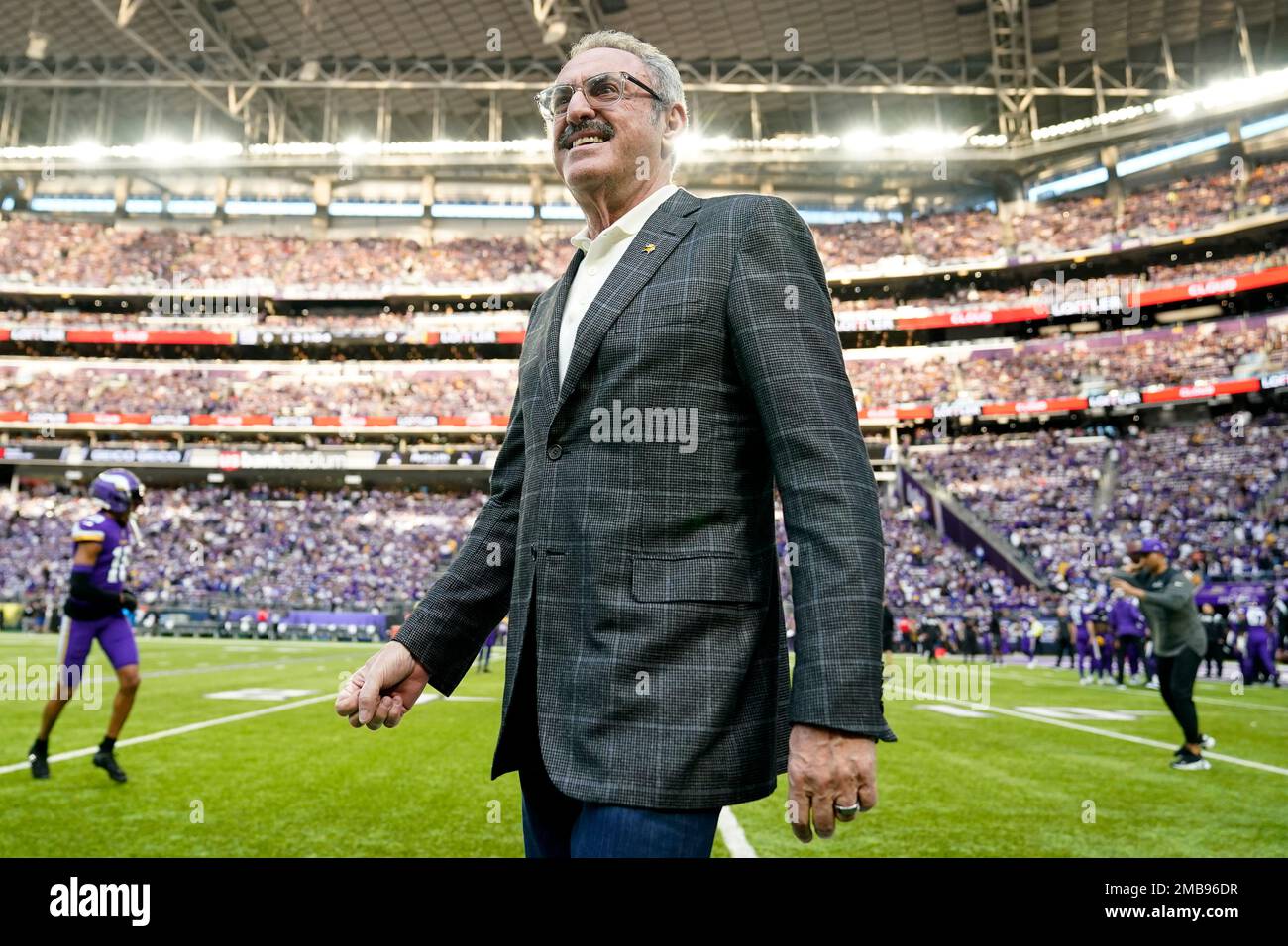 Minnesota Vikings owner Zygi Wilf walks on the field before an NFL wild ...