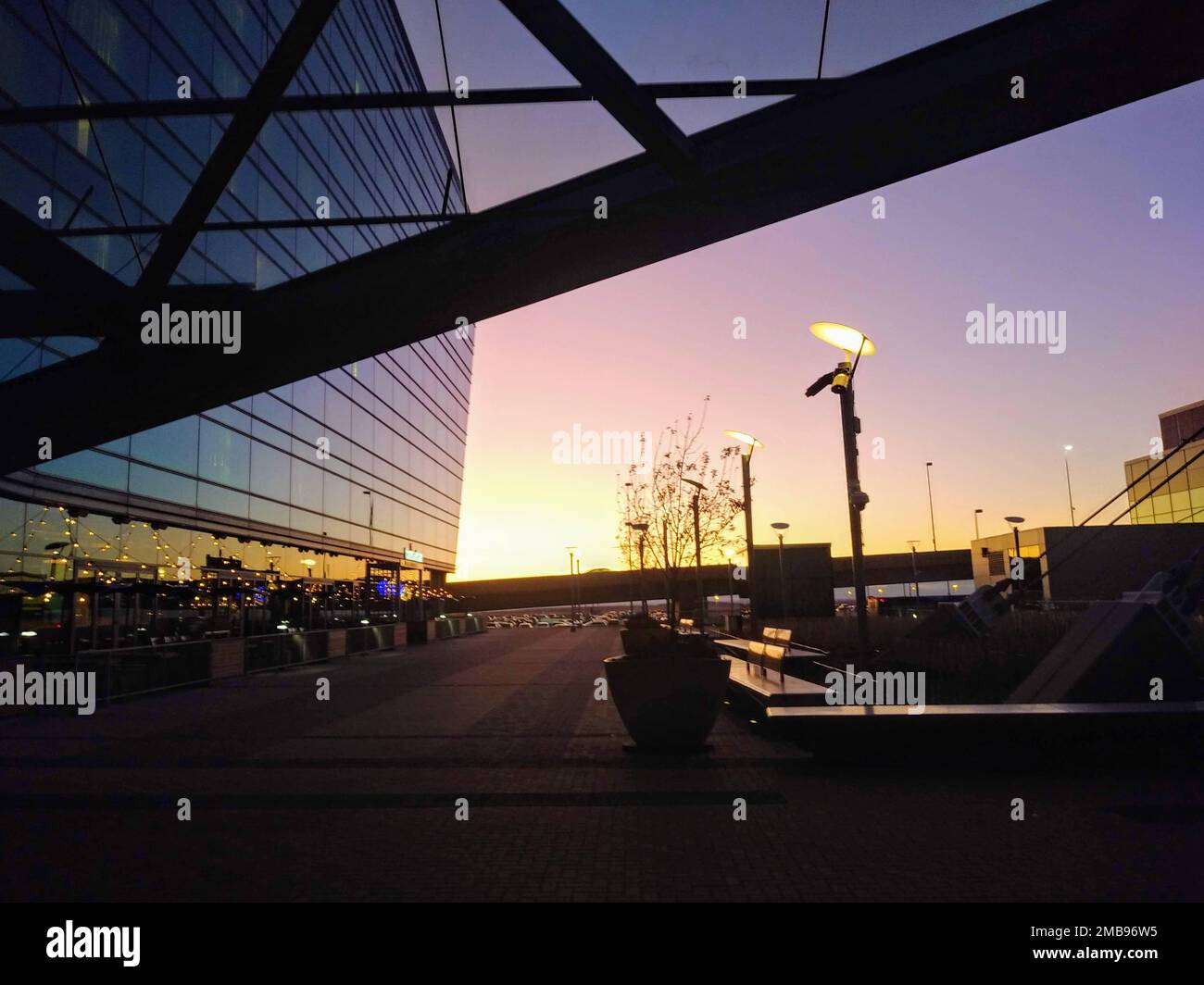 The Denver international airport at sunset with clear and purple sky ...
