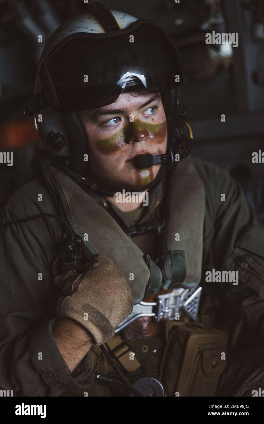 U.S. Marine Corps Cpl. Ryan Caffrey, an MV-22B Osprey crew chief with ...