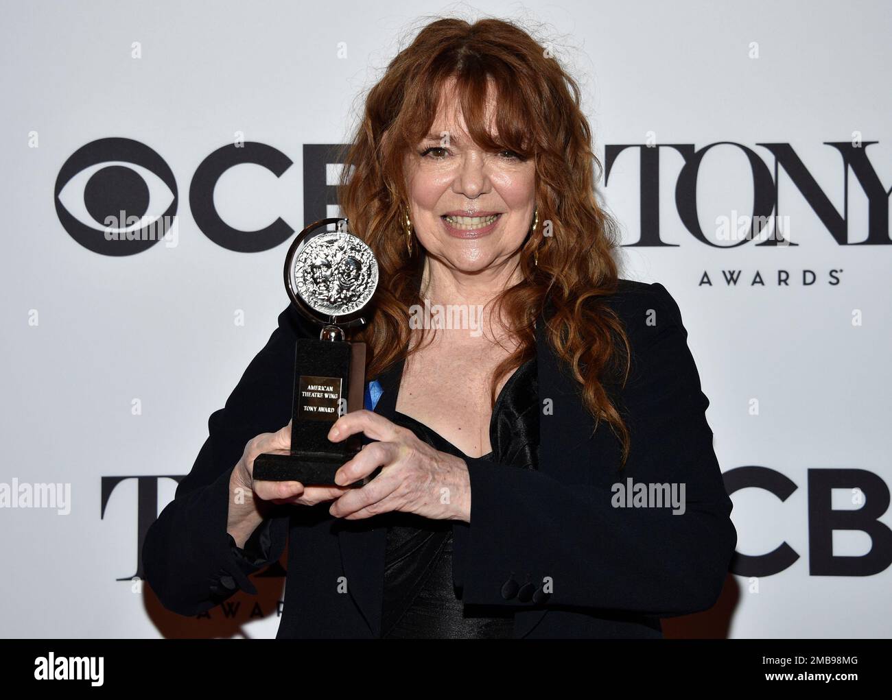 Deirdre O'Connell poses in the press room with the award for best ...