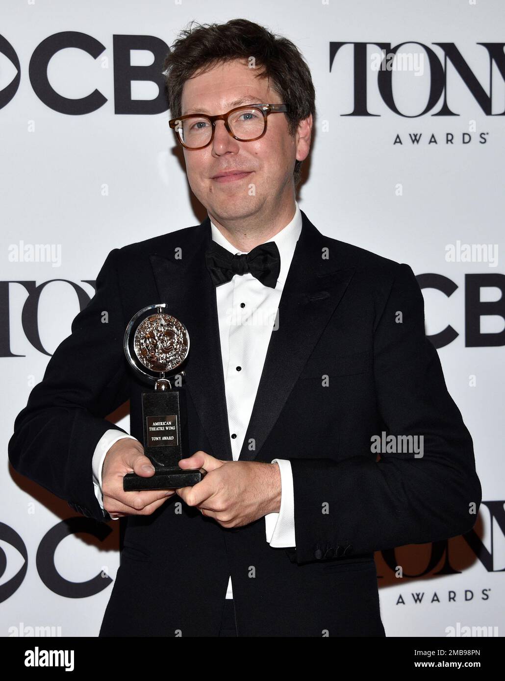 Ben Power poses in the press room with the award for best new play for ...