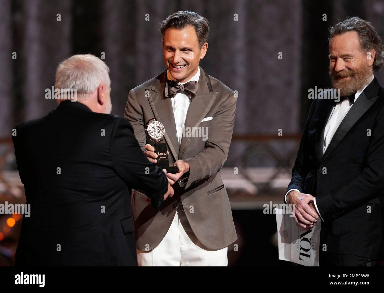 Simon Russell Beale, from left, accepts the award for best leading ...
