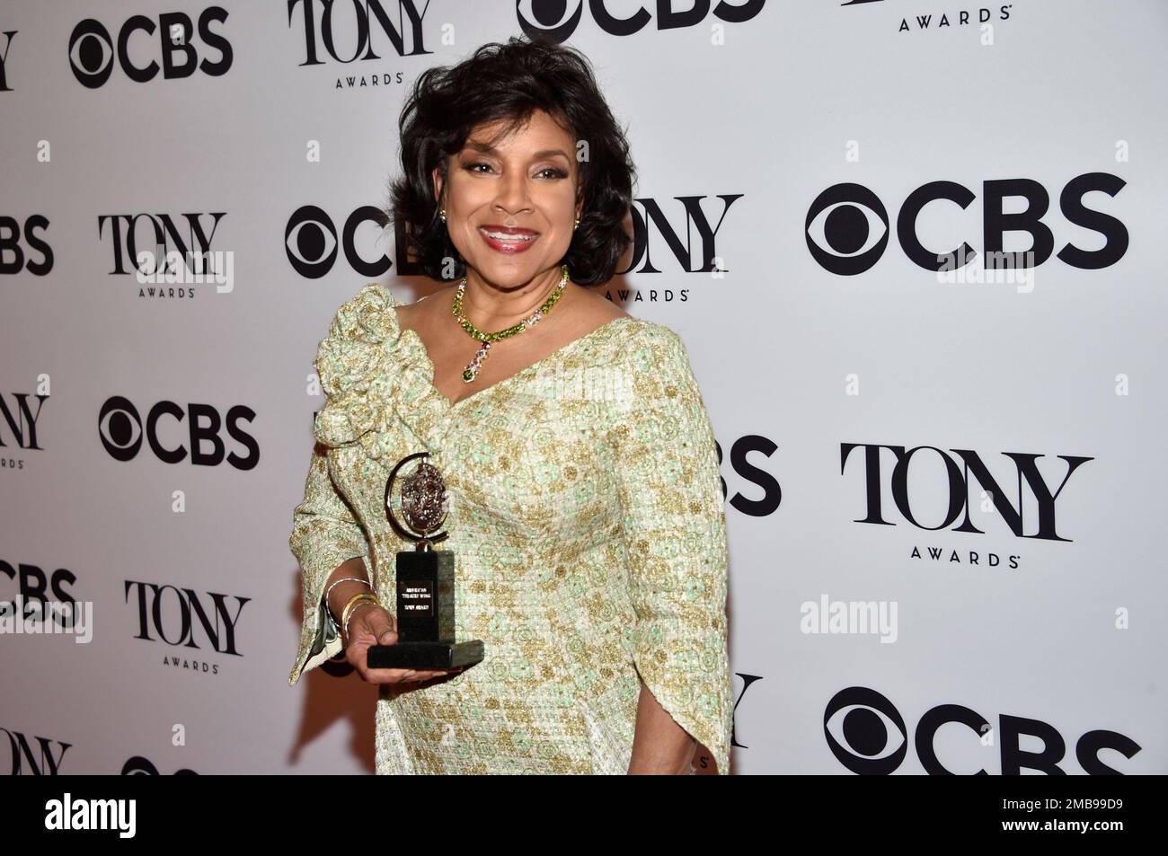 Phylicia Rashad poses in the press room with the award for best ...
