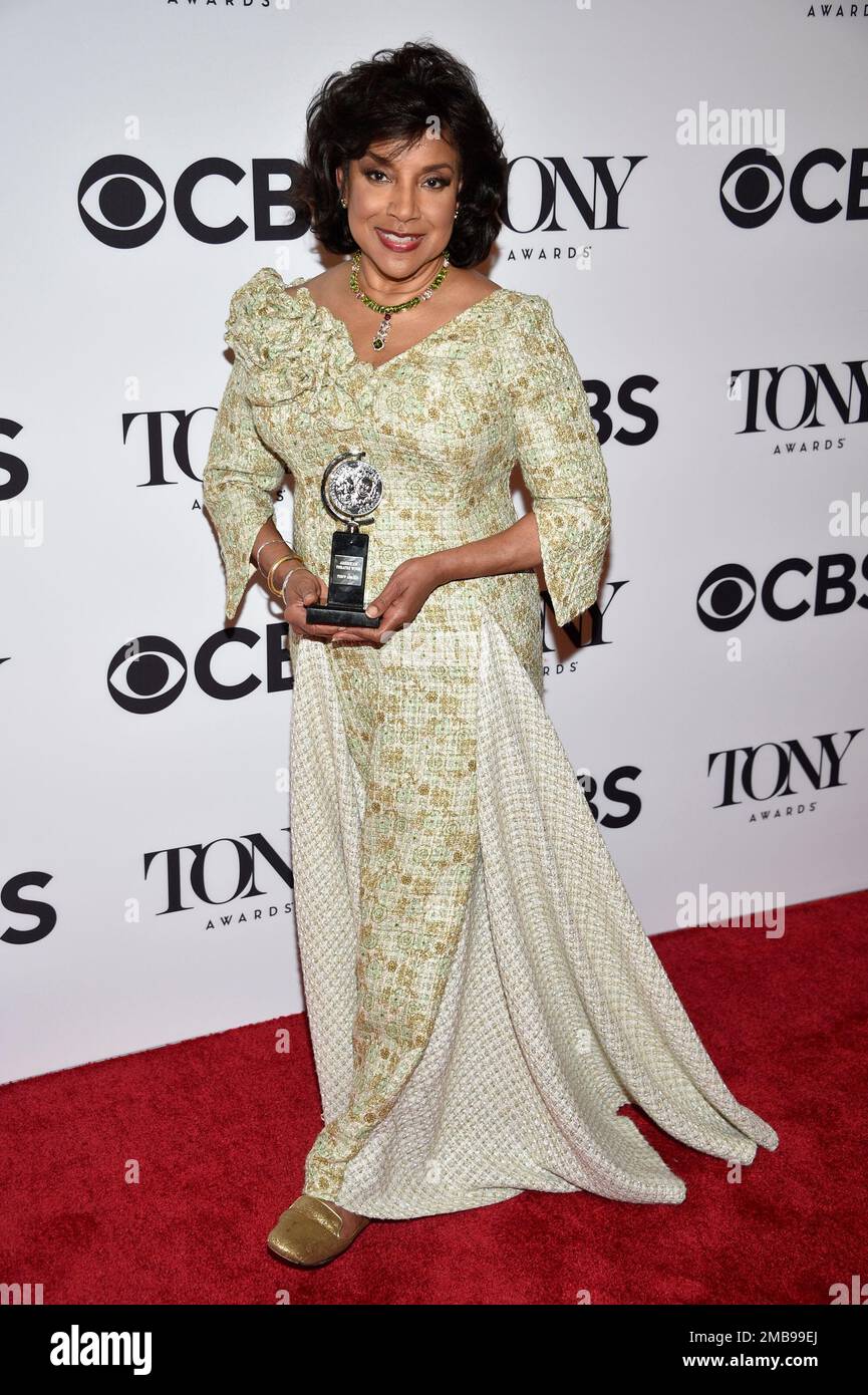 Phylicia Rashad poses in the press room with the award for best ...