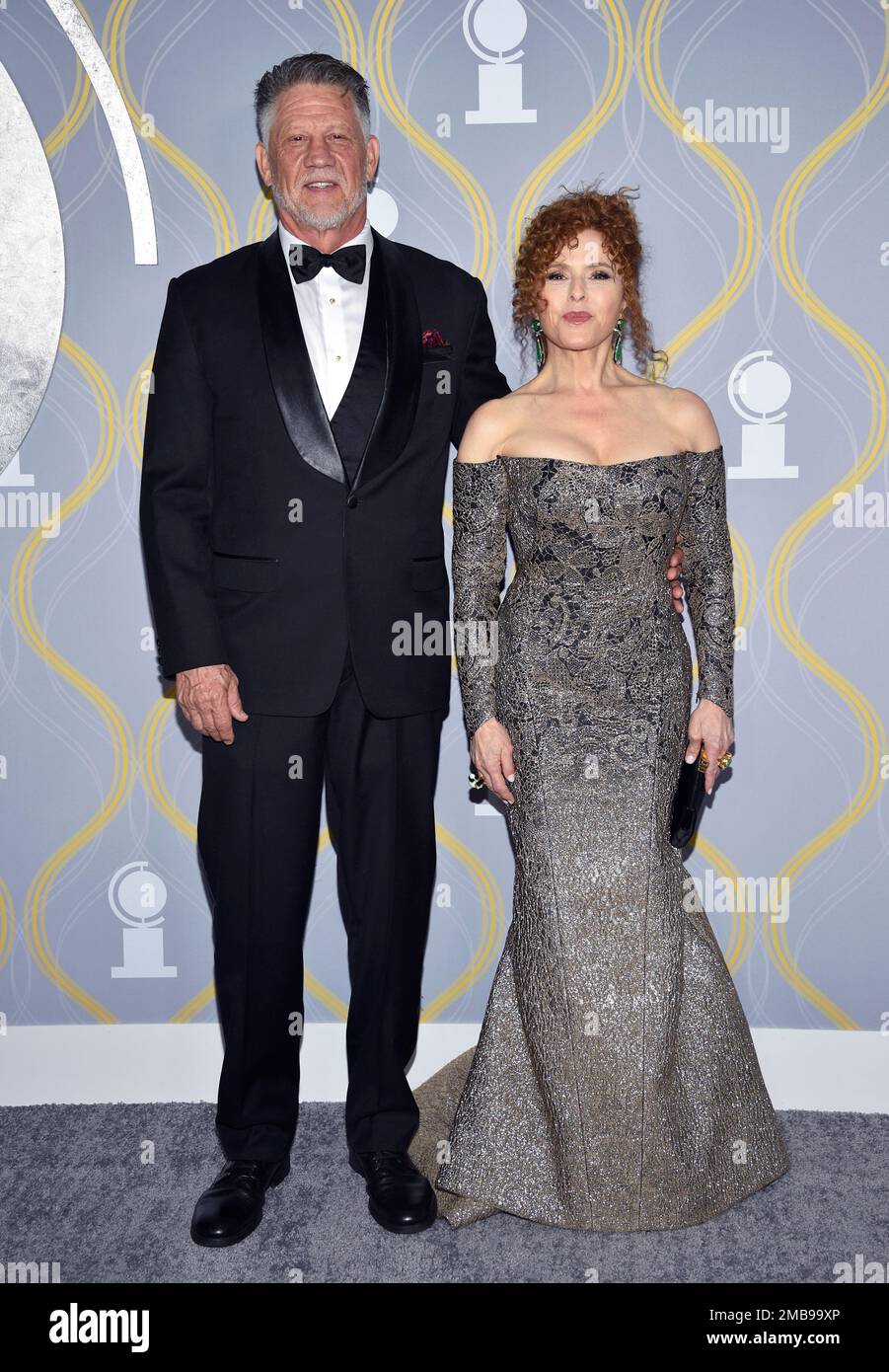 Tom Sorce, left, and Bernadette Peters arrive at the 75th annual Tony ...