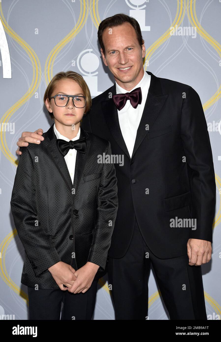 Patrick Wilson, right, and Kassian McCarrell Wilson arrive at the 75th ...