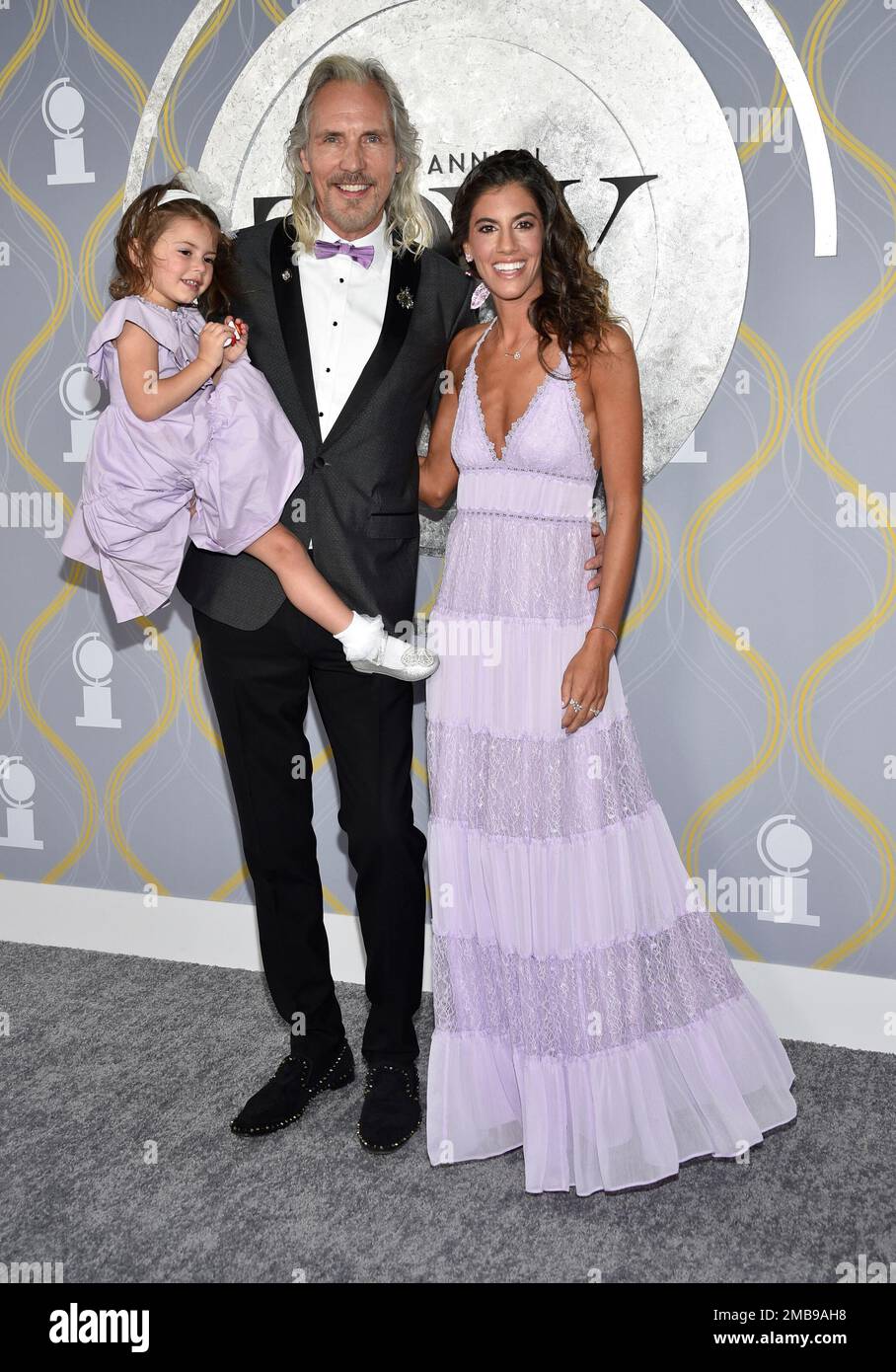 Corey Brunish, left, Jessica Rose Brunish and daughter Olivia arrive at ...