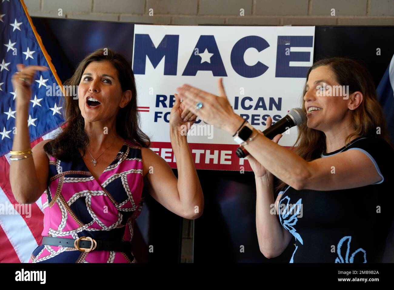Former South Carolina Gov. Nikki Haley, left, cheers alongside U.S. Rep ...