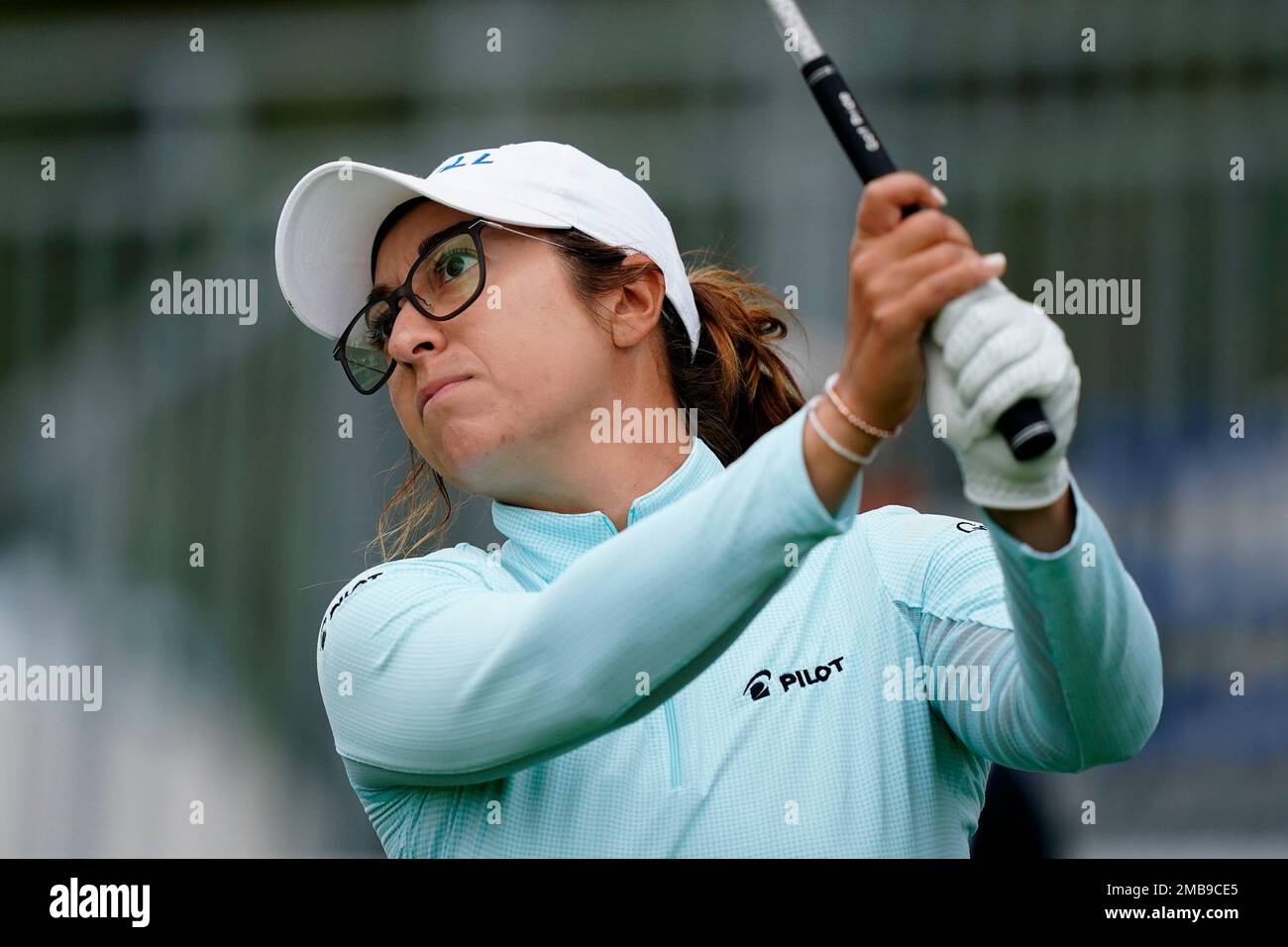 Marina Alex hits off the first tee during the final round of the ...