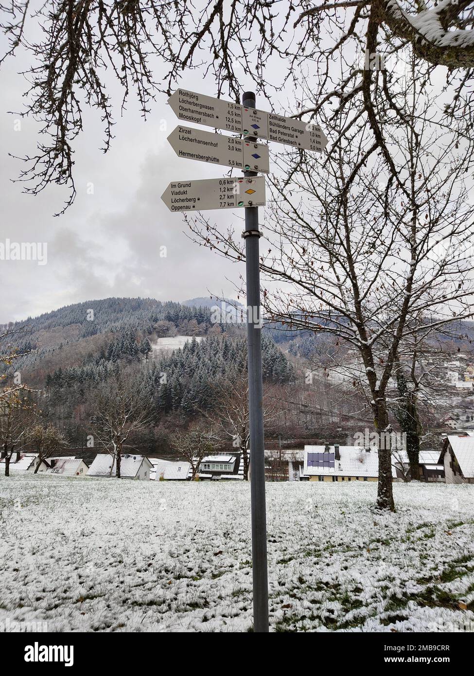 A sign board pole in winter Stock Photo - Alamy