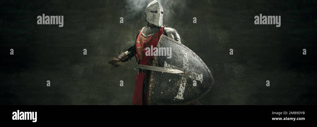 Banner. Serious brutal bearded man, medieval warrior and knight with ...