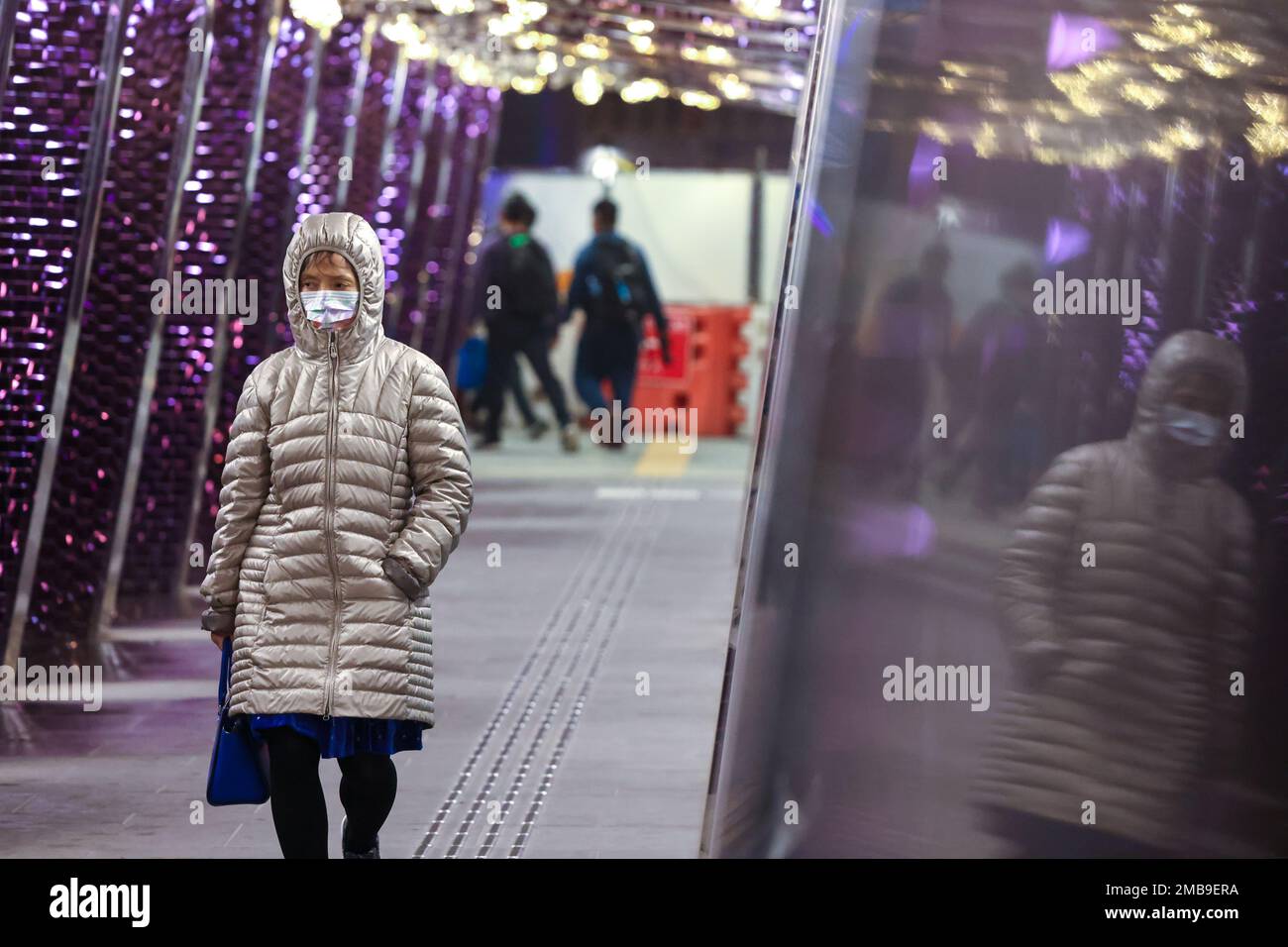 Weather forecast for temperature dropping in coming days. People walk ...