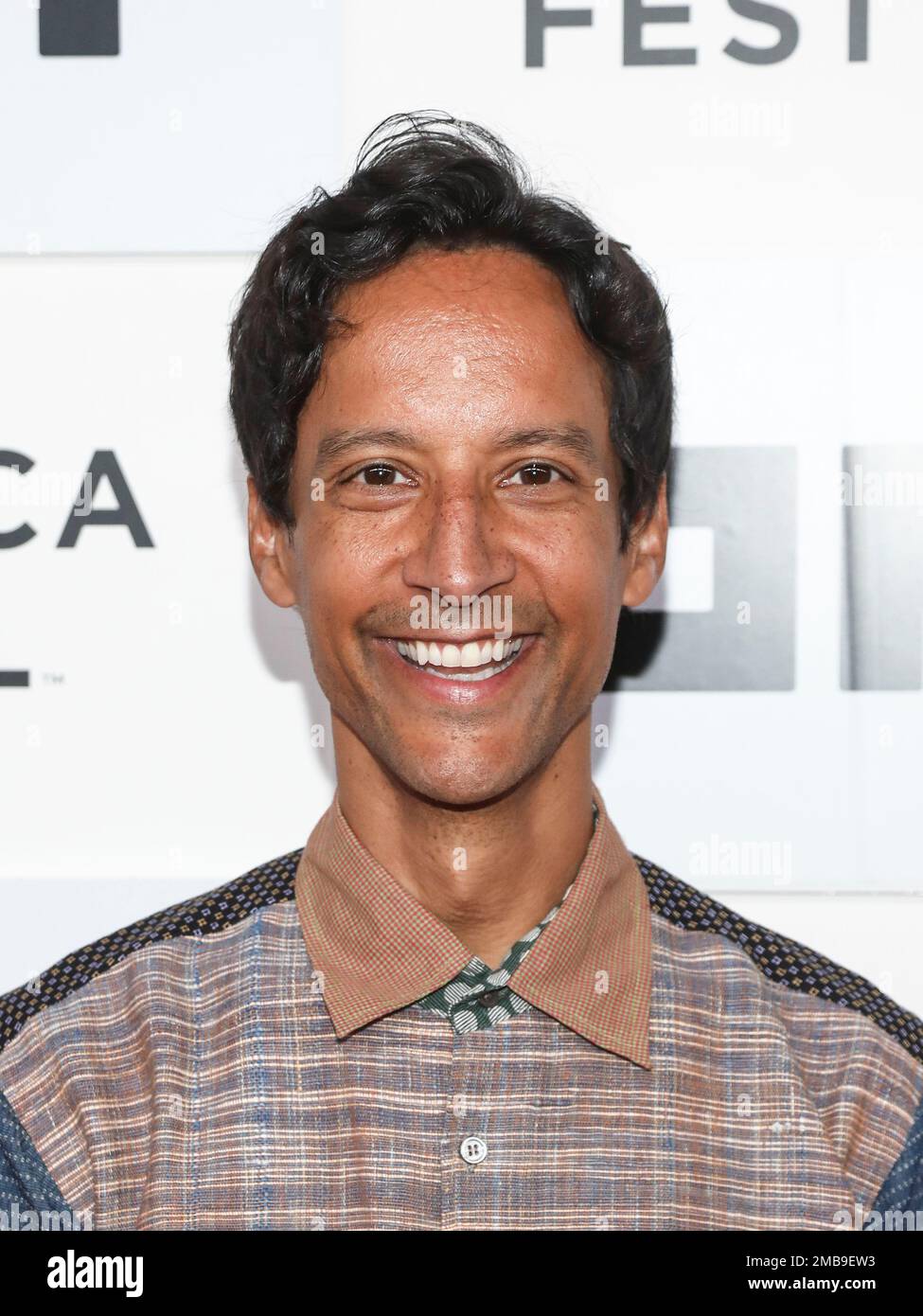 Actor Danny Pudi attends the premiere for "American Dreamer" at the ...