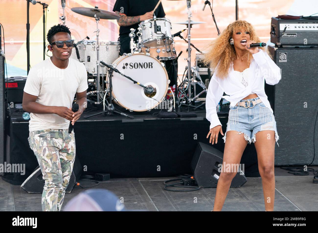 BRELAND, left, and Tiara Kennedy perform during CMA Fest 2022 on ...