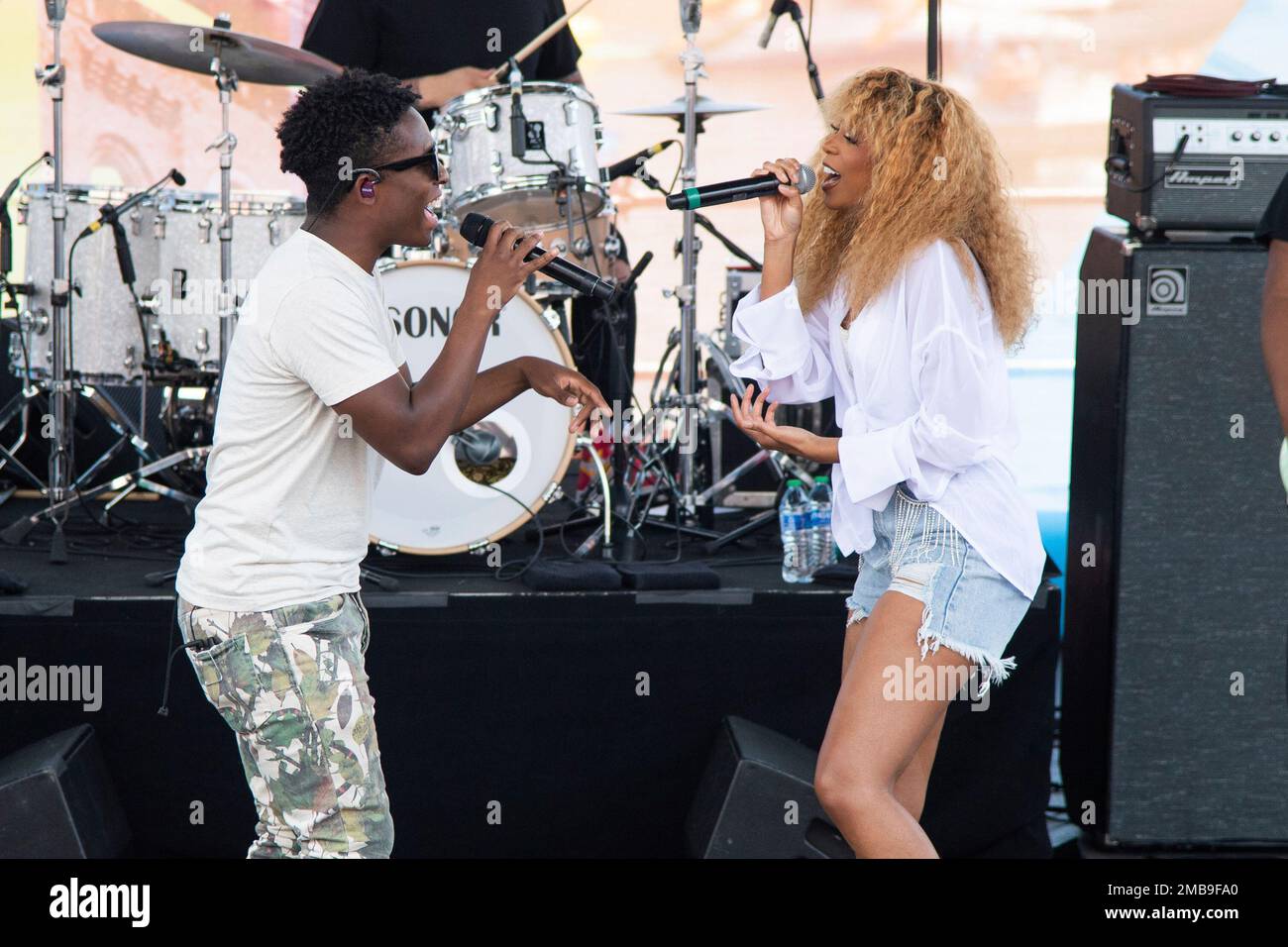 BRELAND, left, and Tiara Kennedy perform during CMA Fest 2022 on ...