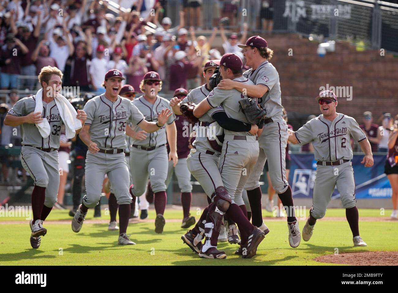 Texas A&M pitcher Jacob Palisch (33) and catcher Troy Claunch (12 ...