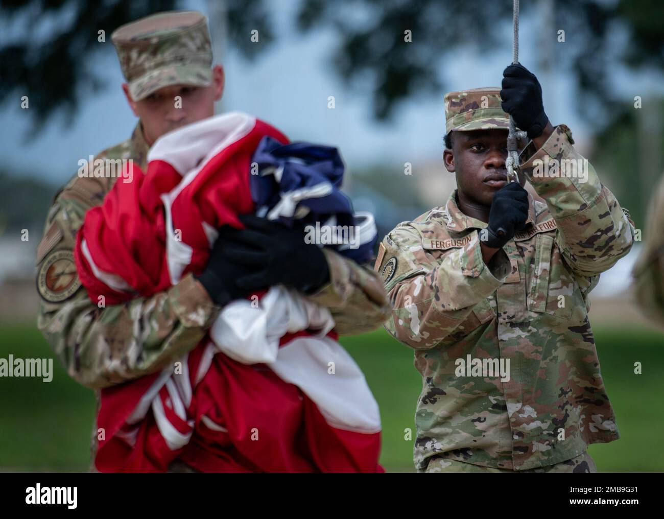 Tech. Sgt. Jerry Tamayo, 96th Medical Group, carries the base flag to ...