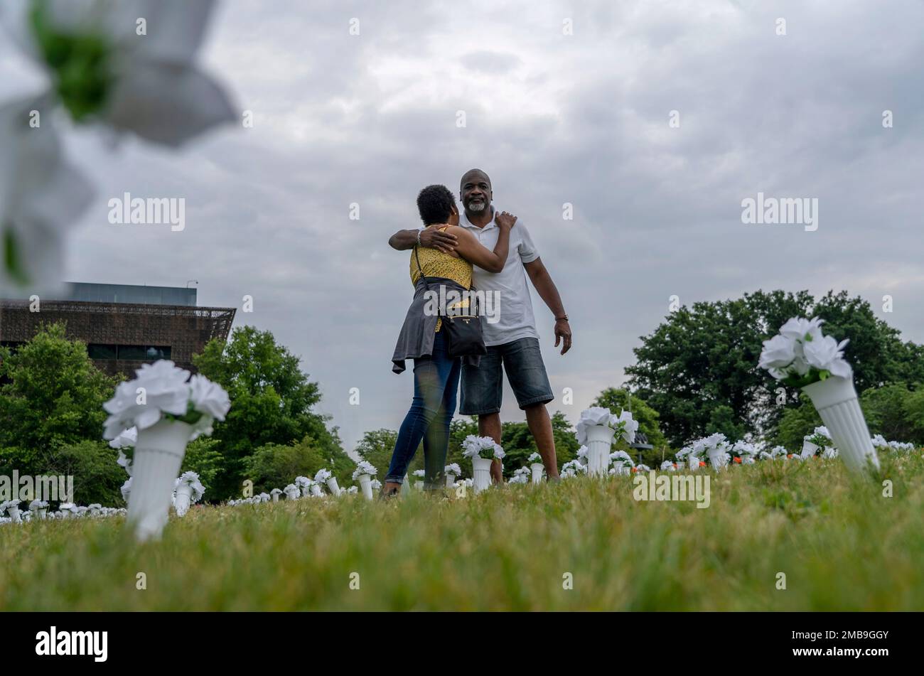 Hamlet Sancho and Marcella Sancho hug each other after praying amid the ...