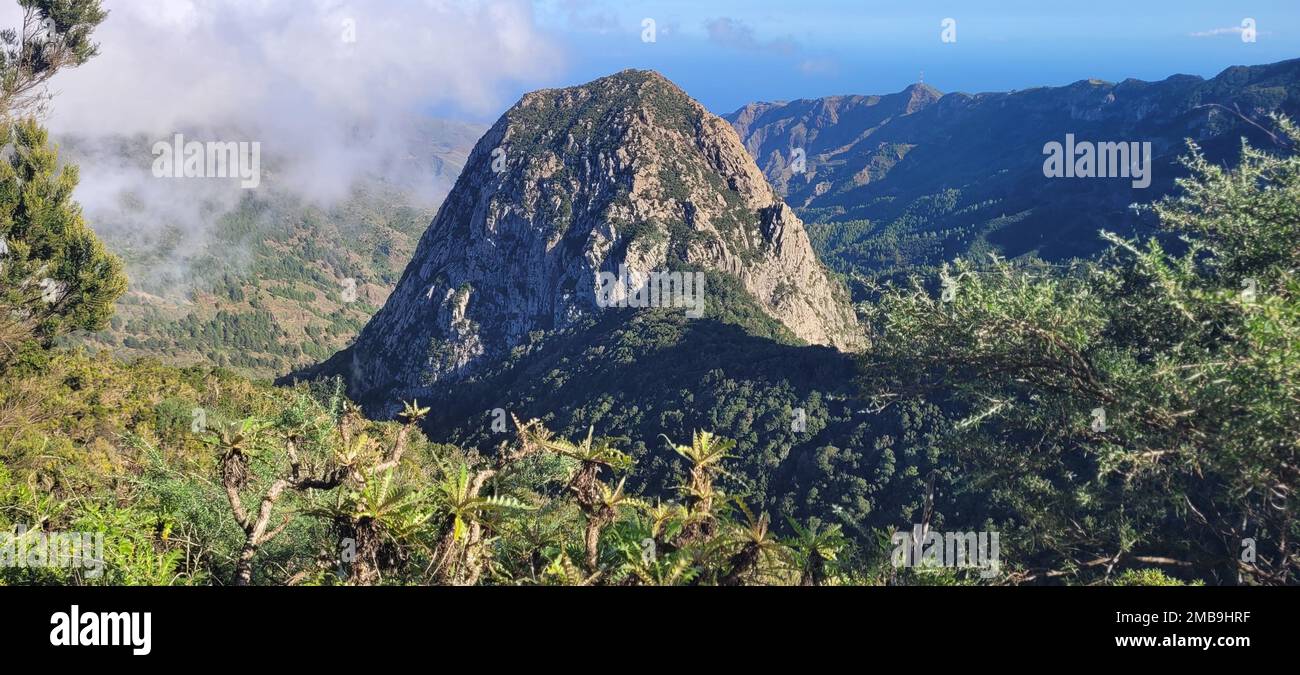 A panoramic landscape of the mesmerizing green mountains Stock Photo ...