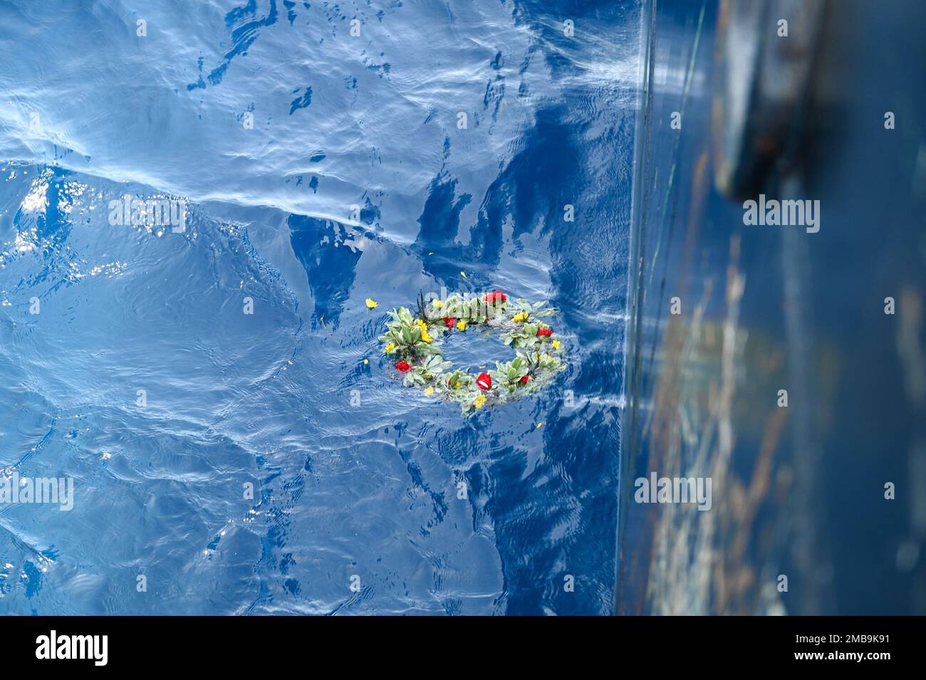 a wreath is laid at the sight of a sunken German U-boat in the ...