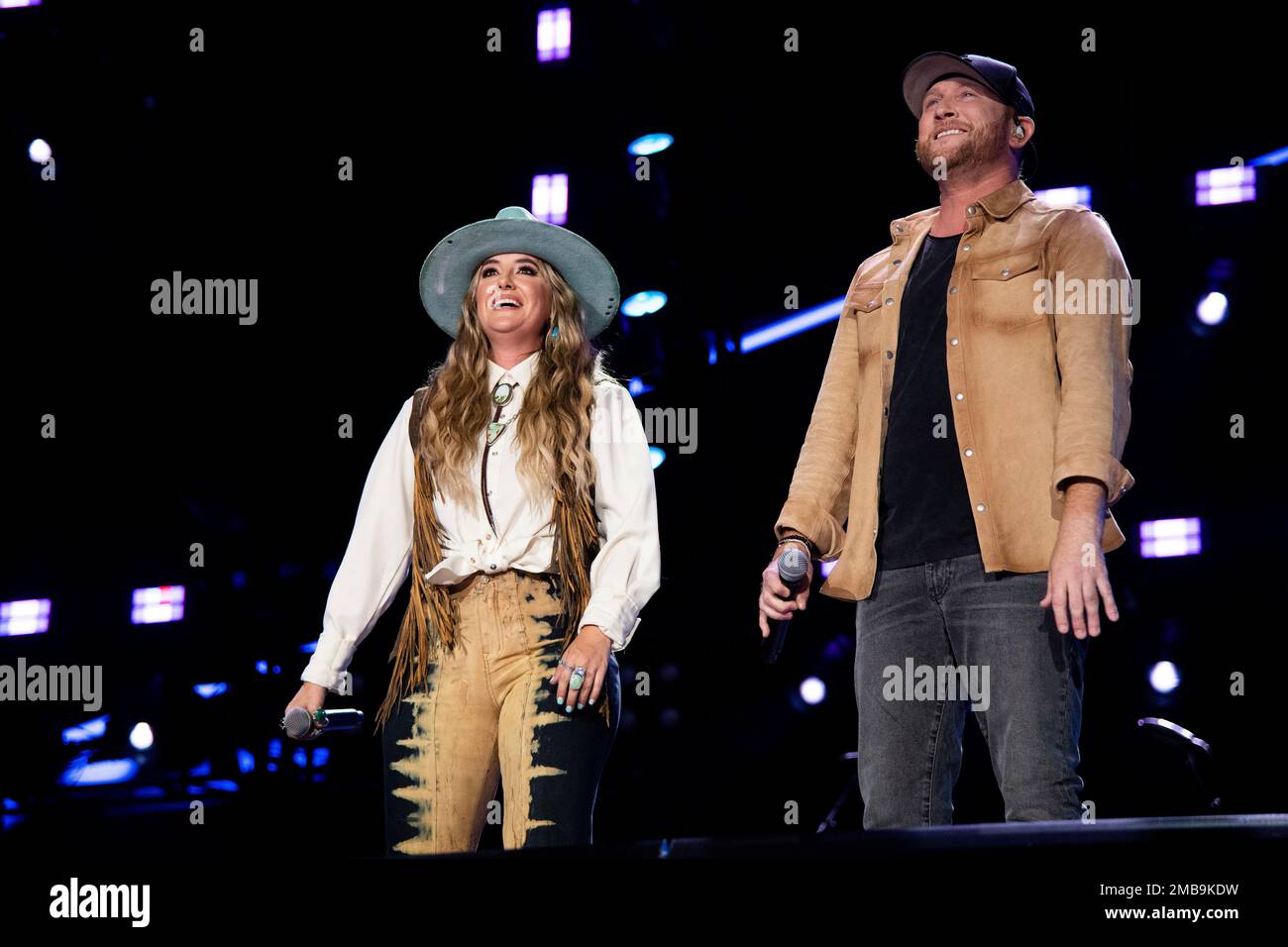 Lainey Wilson, left, and Cole Swindell perform during CMA Fest 2022 on ...