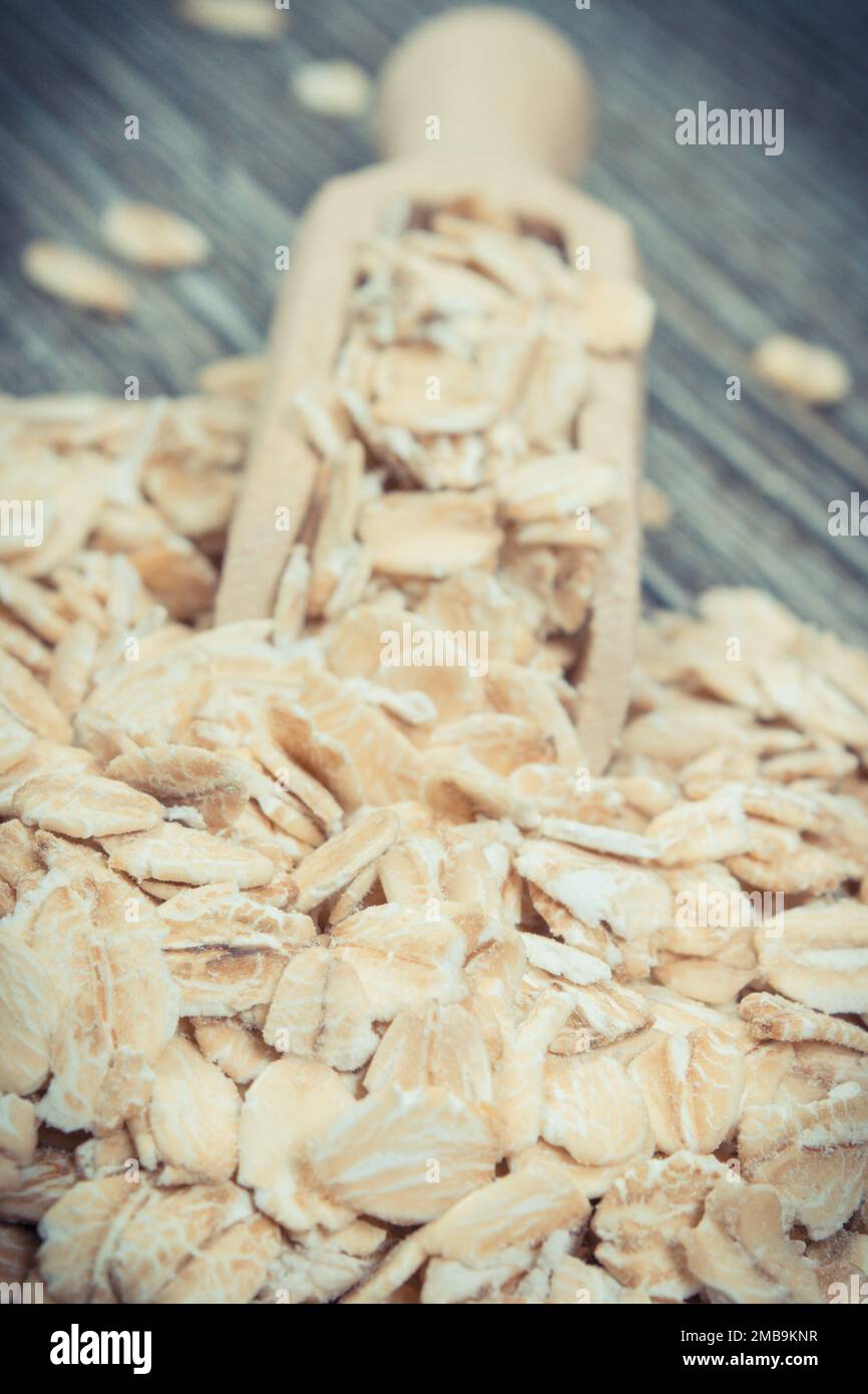 Heap of rye flakes or oat bran containing dietary fiber and natural ...