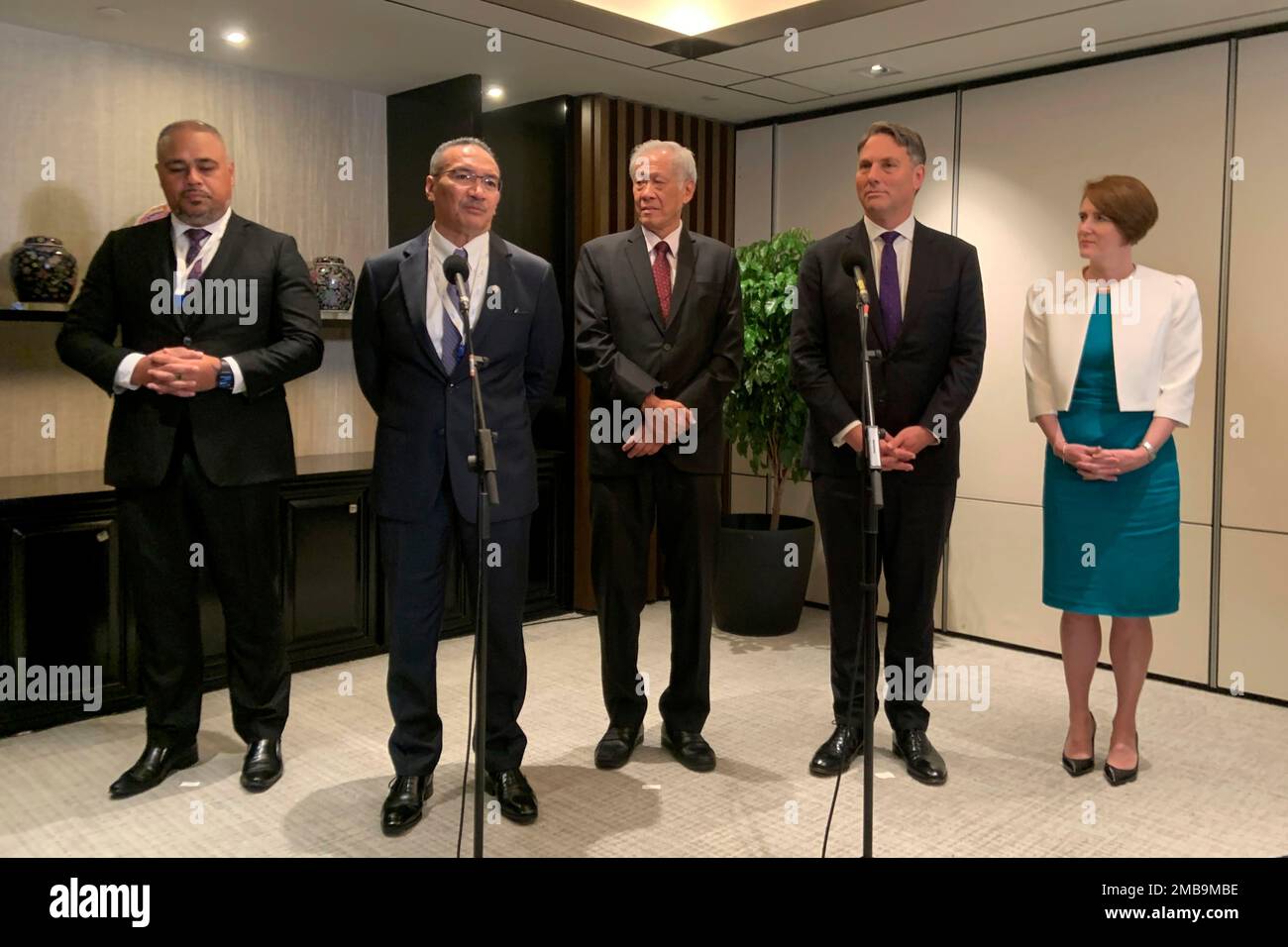 Defense officials and representatives from the Five Powers Defense ...