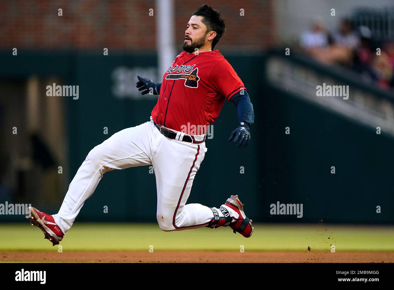 Atlanta Braves' Travis d'Arnaud (16) slides into second base with a ...