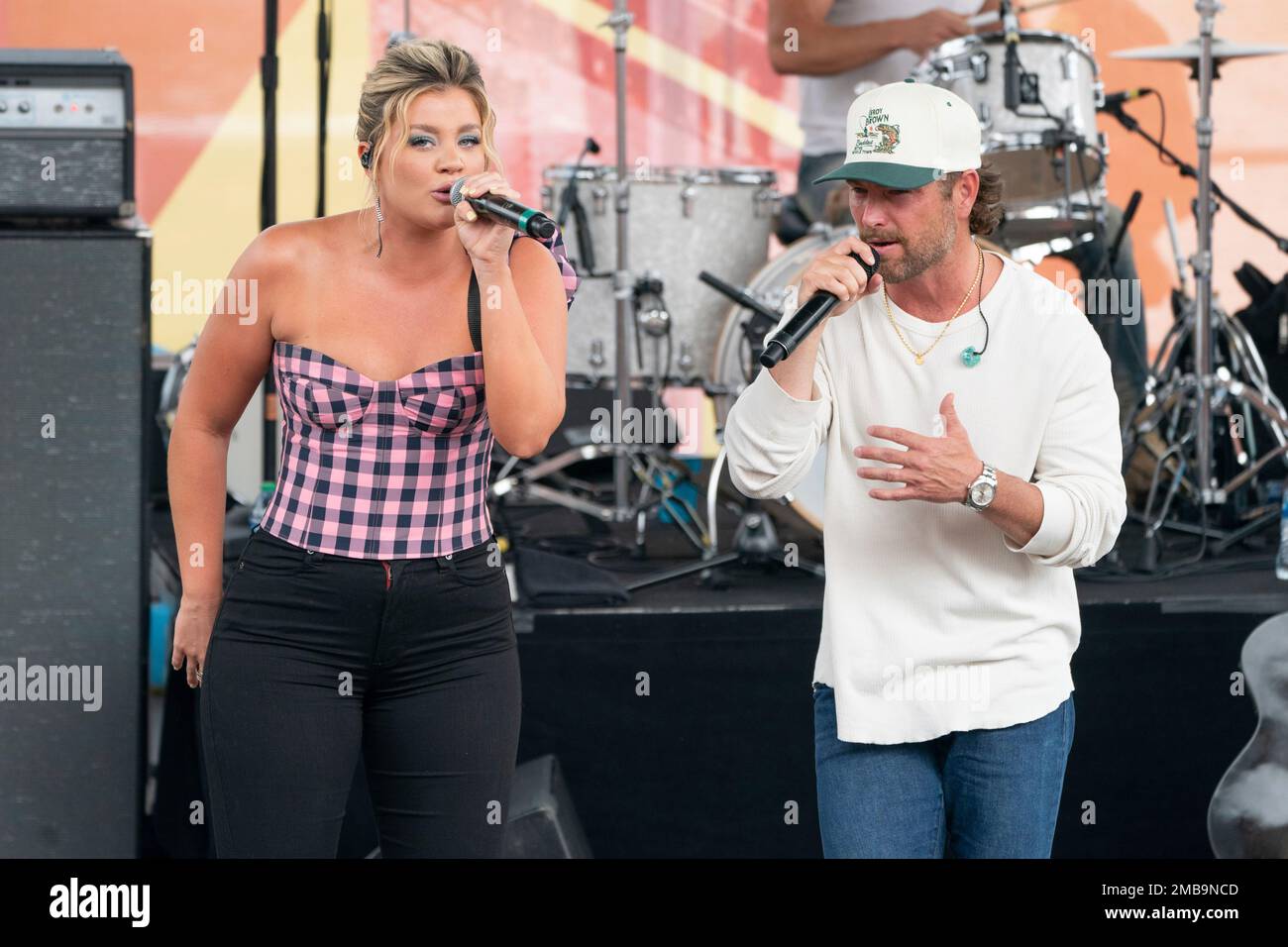 Lauren Alaina, left, and Chris Lane perform during CMA Fest 2022 on ...