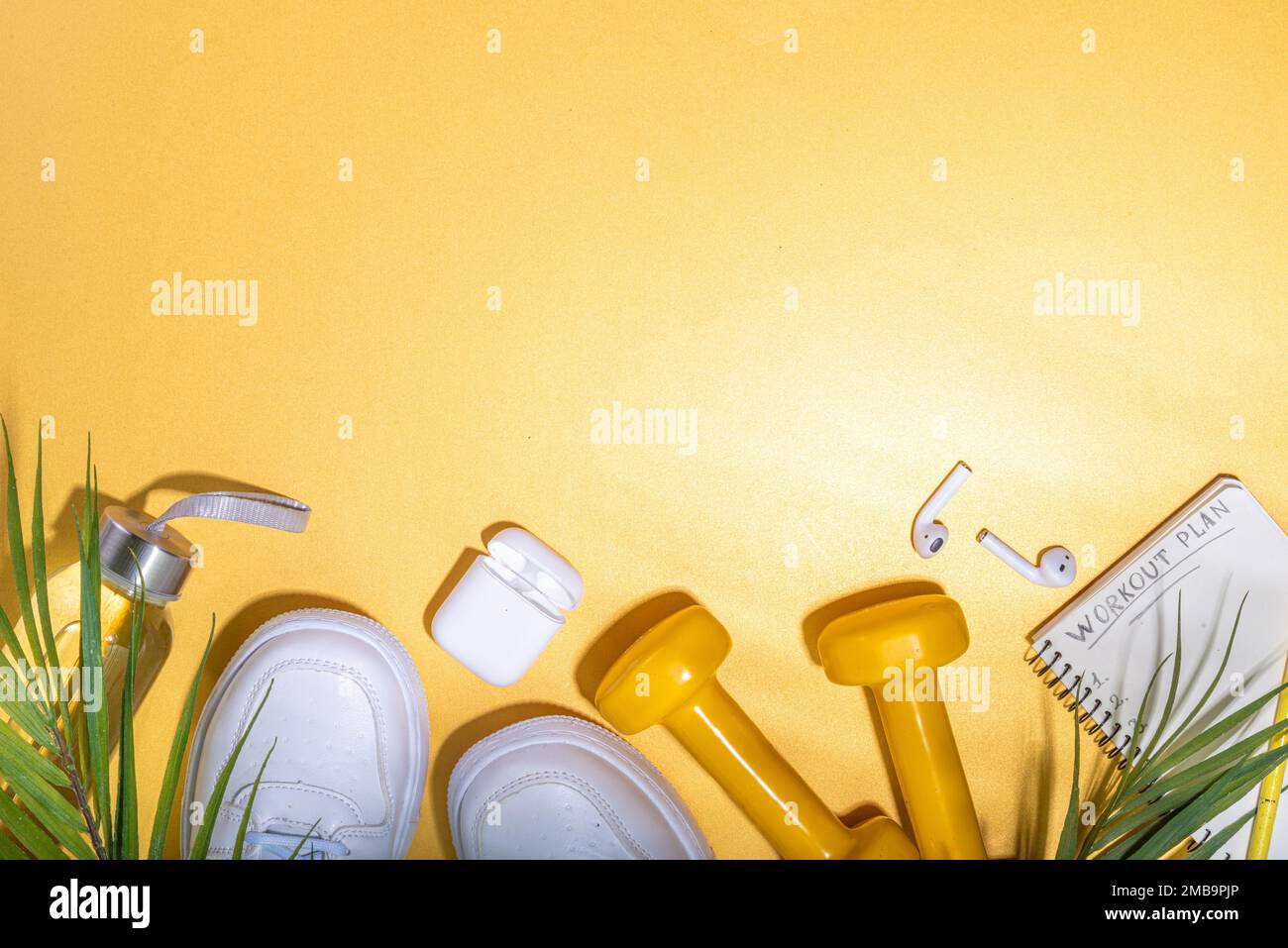 Summer sport and fitness background. Sport shoes, dumbbells, blank ...