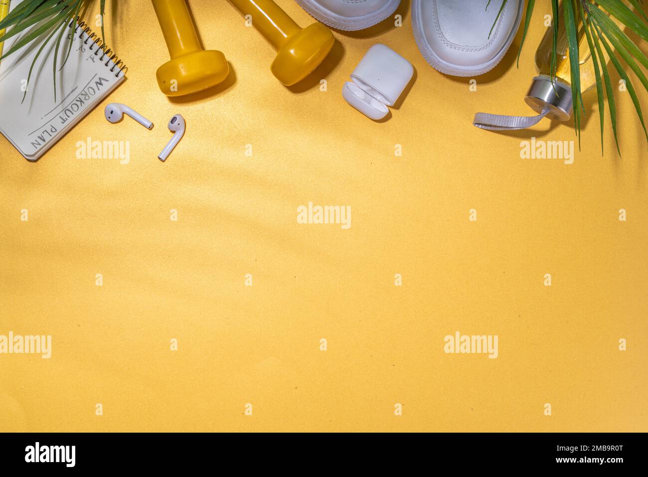 Summer sport and fitness background. Sport shoes, dumbbells, blank ...