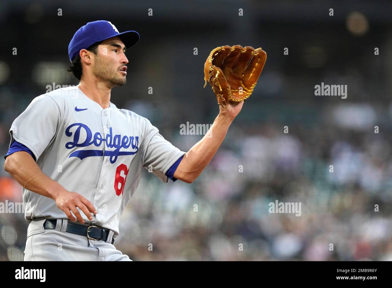 Los Angeles Dodgers pitcher Mitch White covers first during a baseball ...