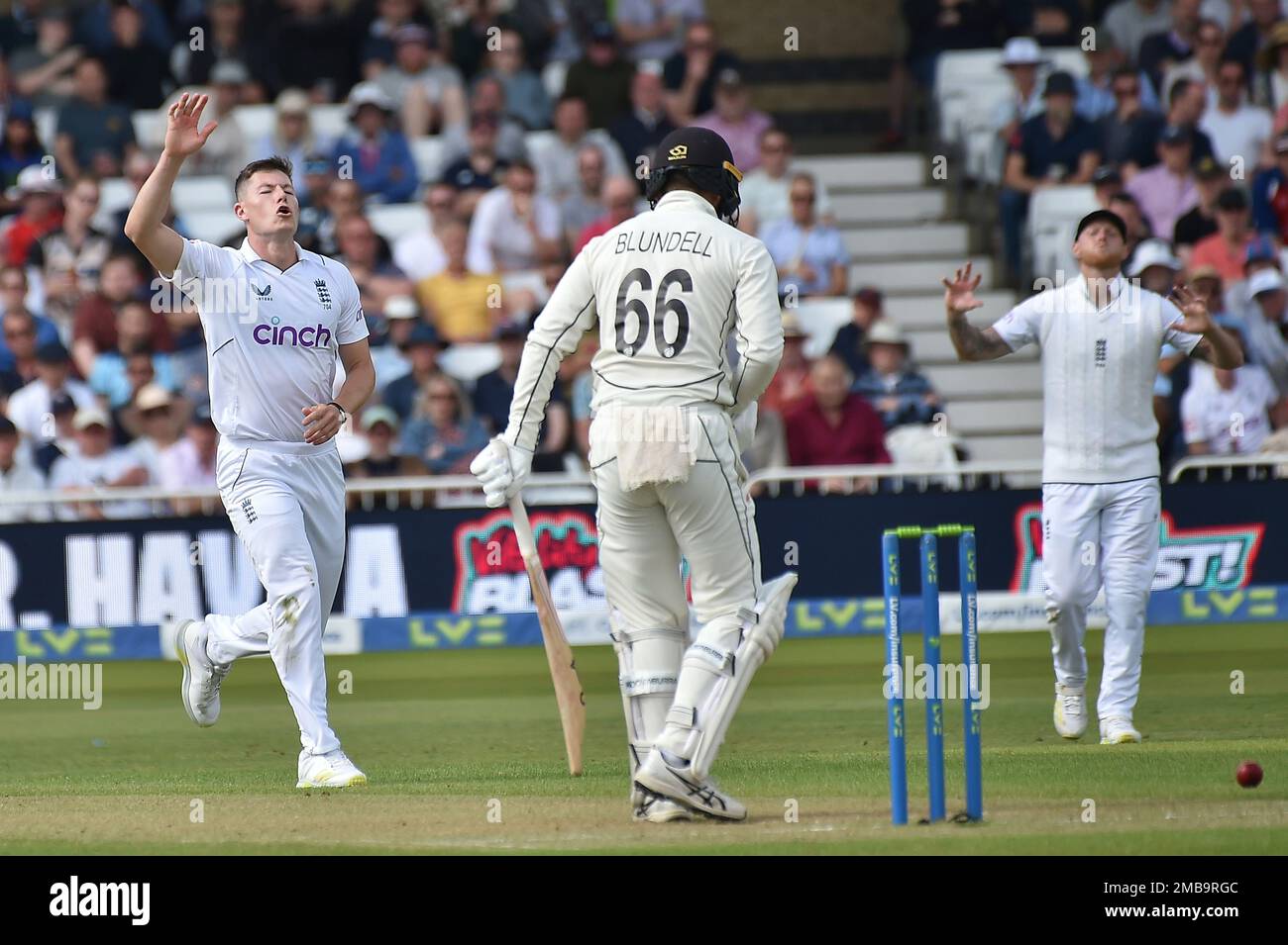 England's Matthew Potts, left, reacts during the first day of the 2nd ...
