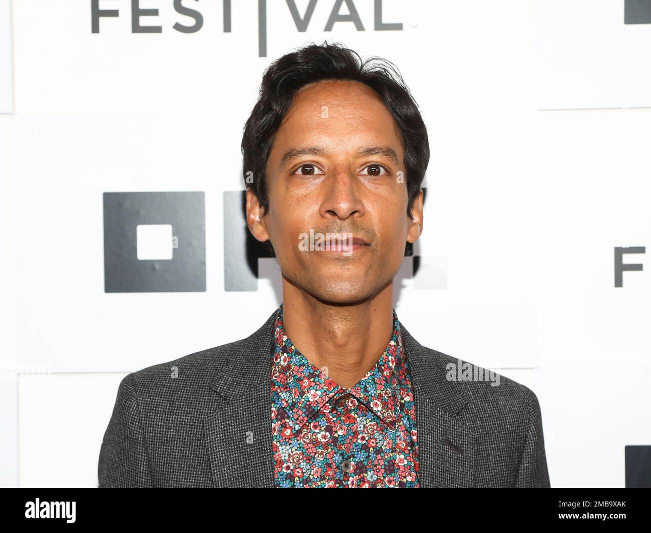 Actor Danny Pudi attends the premiere for "Corner Office" at the BMCC ...