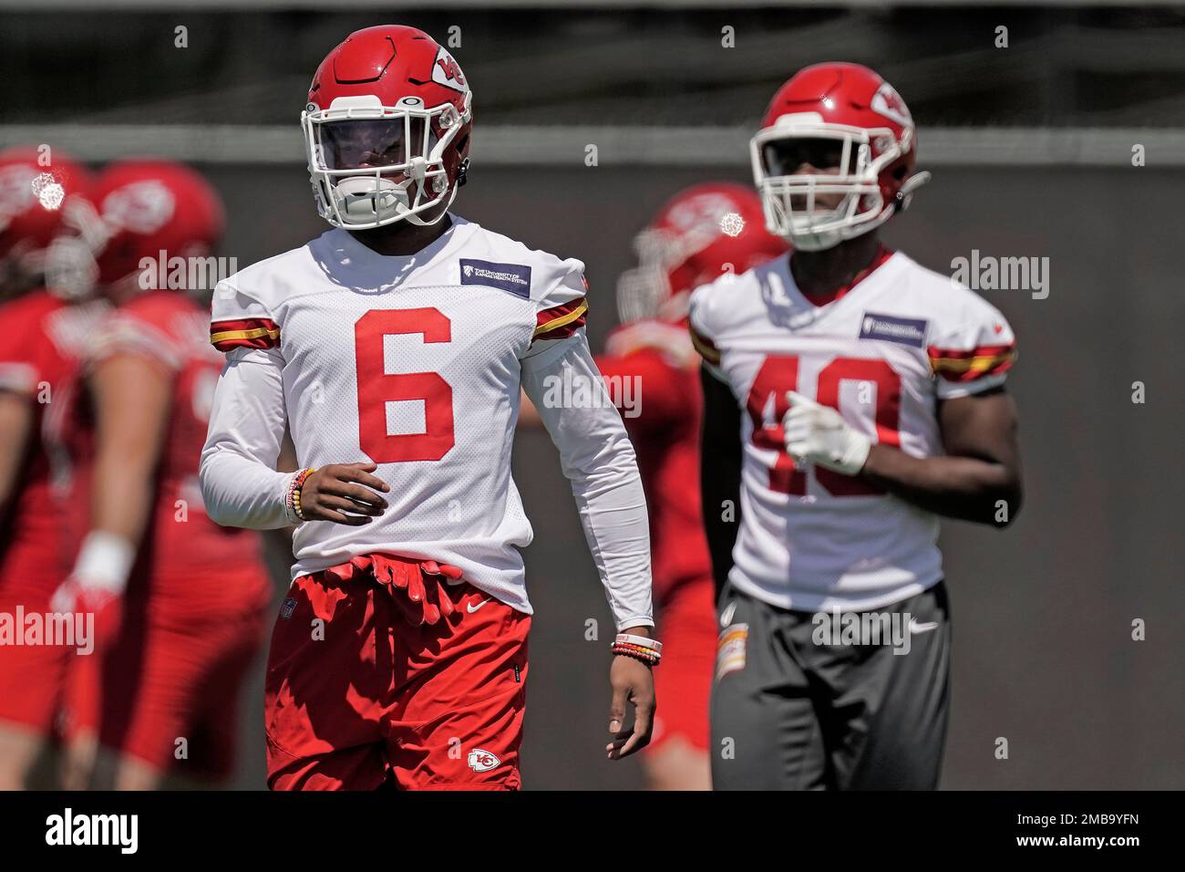 Kansas City Chiefs safety Bryan Cook stretches during the NFL football ...