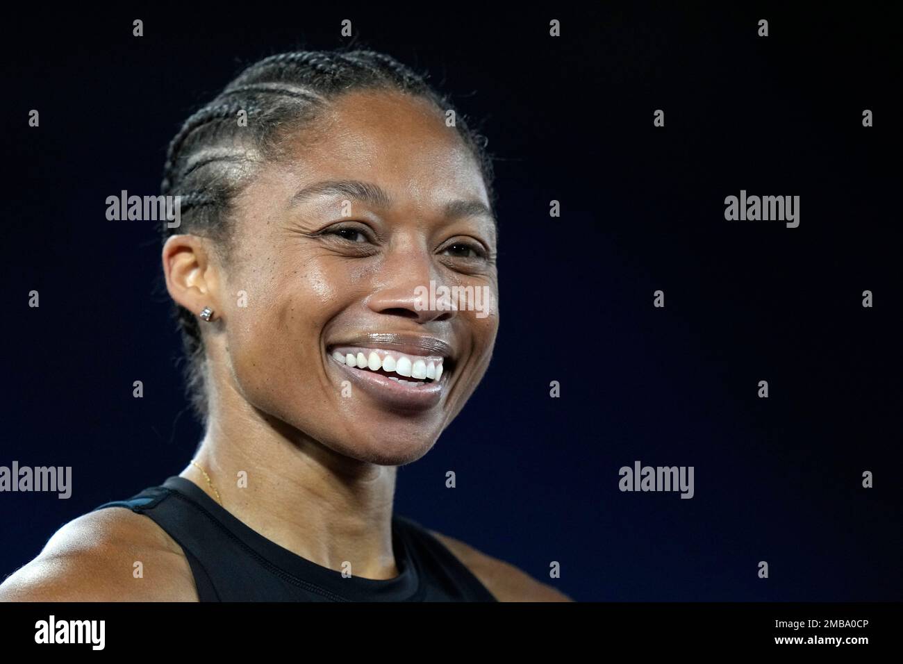 Allyson Felix of the United States smiles at the finish line of the ...