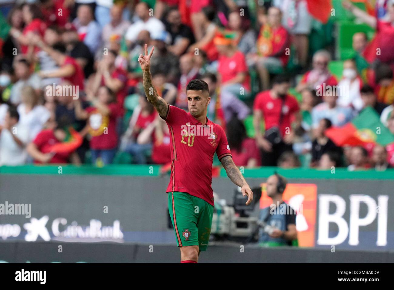 Portugal's Joao Cancelo celebrates after scoring his side's first goal ...