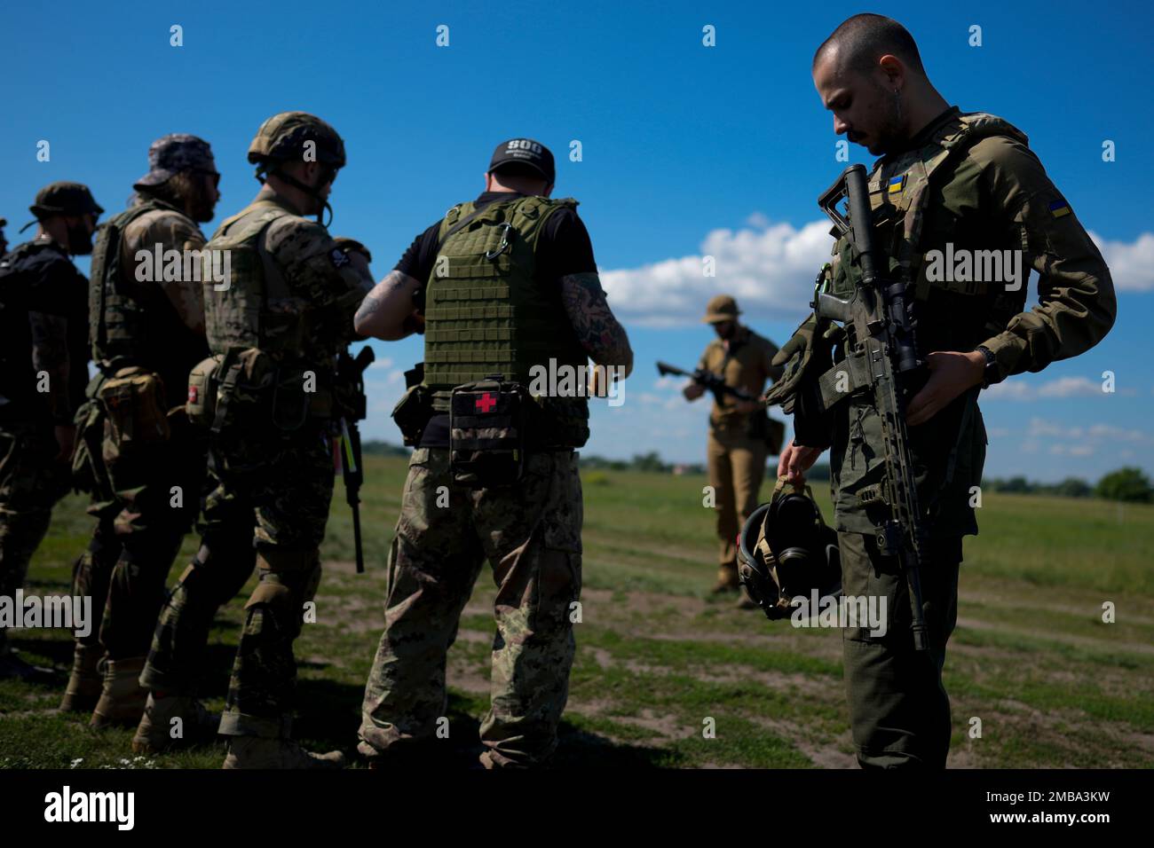 Rapper Viacheslav Drofa, known as Otoy, right, attends a training ...