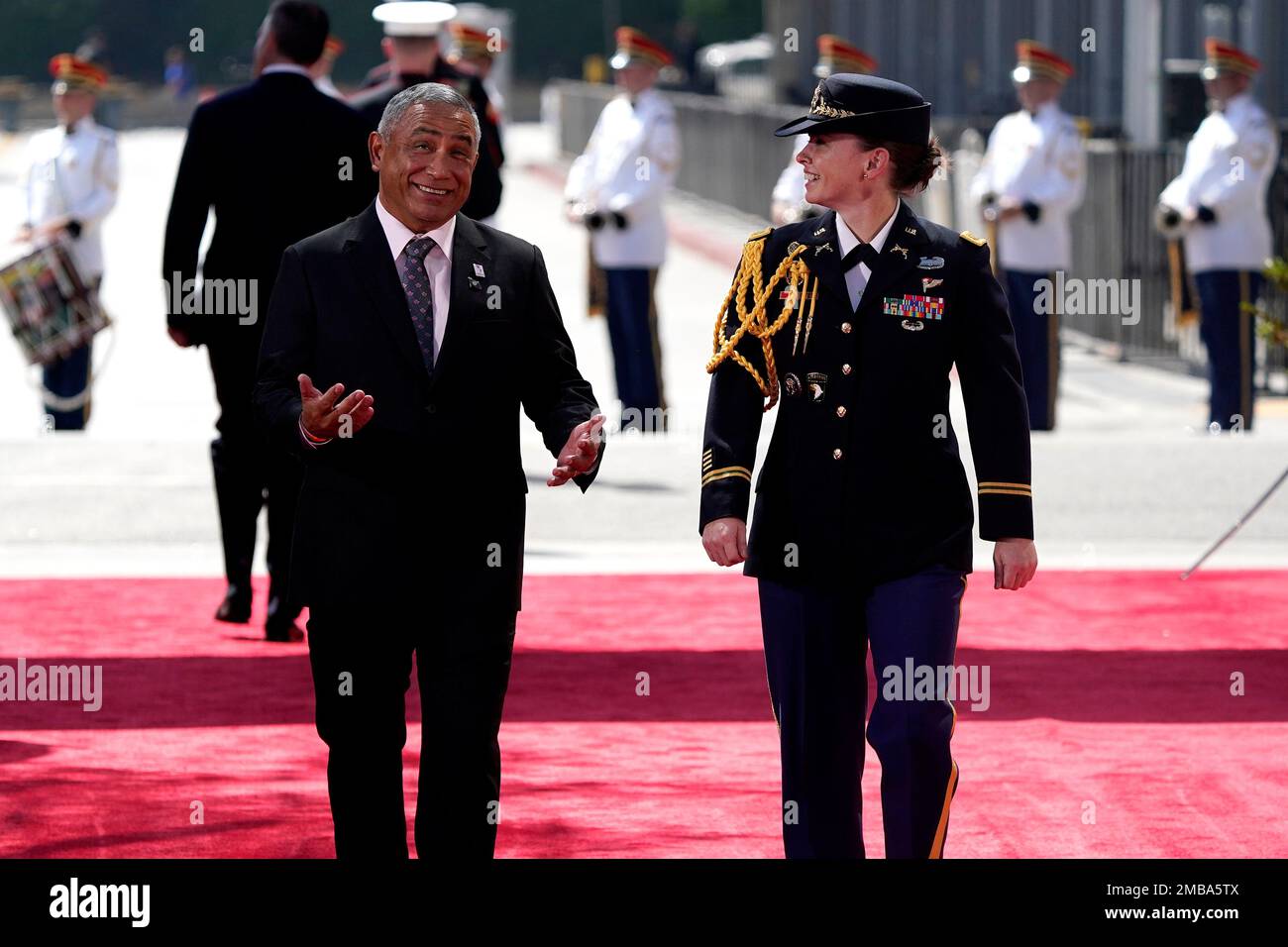 The Honorable John Briceño, Prime Minister of Belize, left, walks on on ...