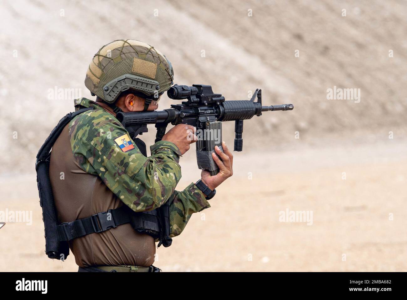 LA VENTA, Honduras – An Ecuadorian Army soldier shoots at the range for ...