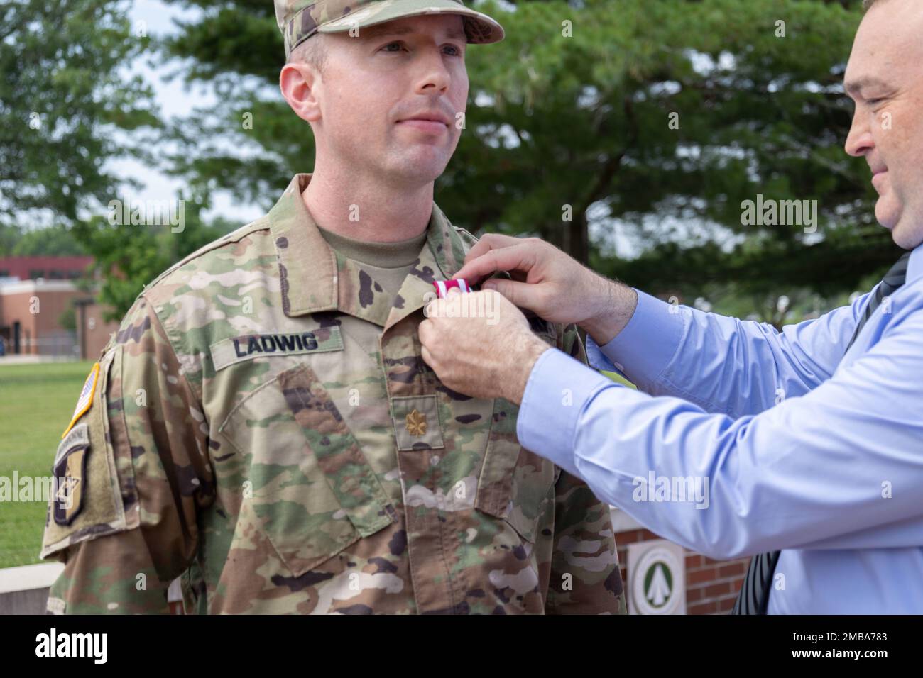 Maj. Timothy Ladwig (left), plans officer in charge, 1st Theater ...