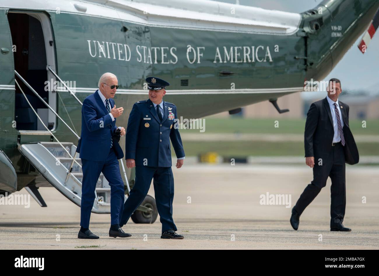 President Joe Biden, escorted by Colonel Matthew Jones, Commander, 89th ...