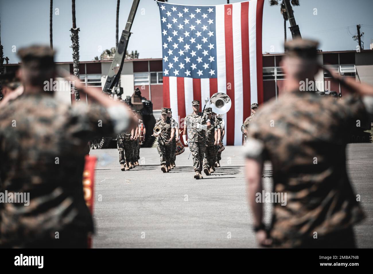 U.S. Marine Corps Lt. Col. Daniel R. Petronzio (right) salutes during a ...